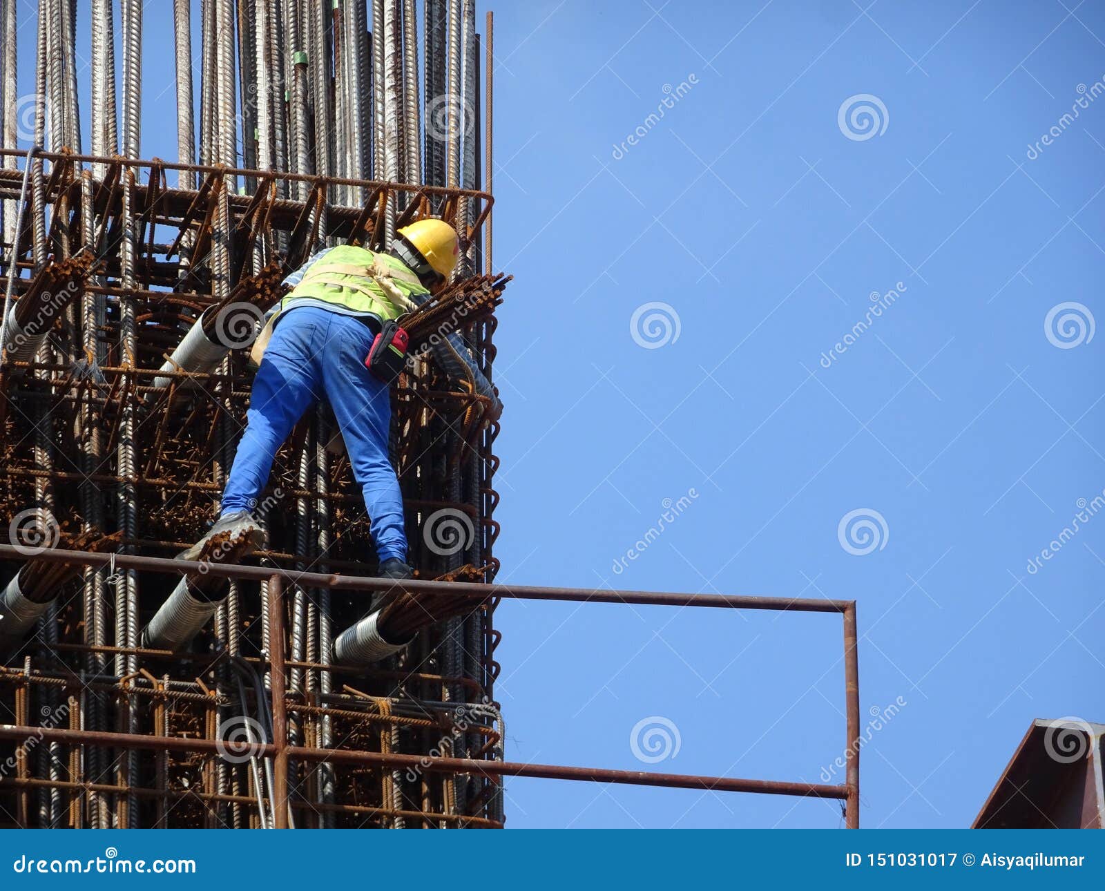 Construction Workers Working at Height at the Construction Site ...