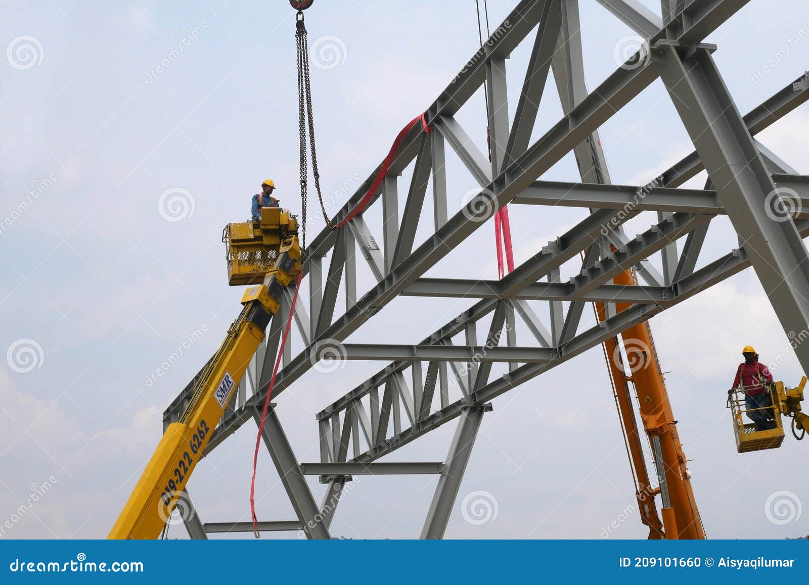 Construction Workers Working at Height at the Construction Site ...