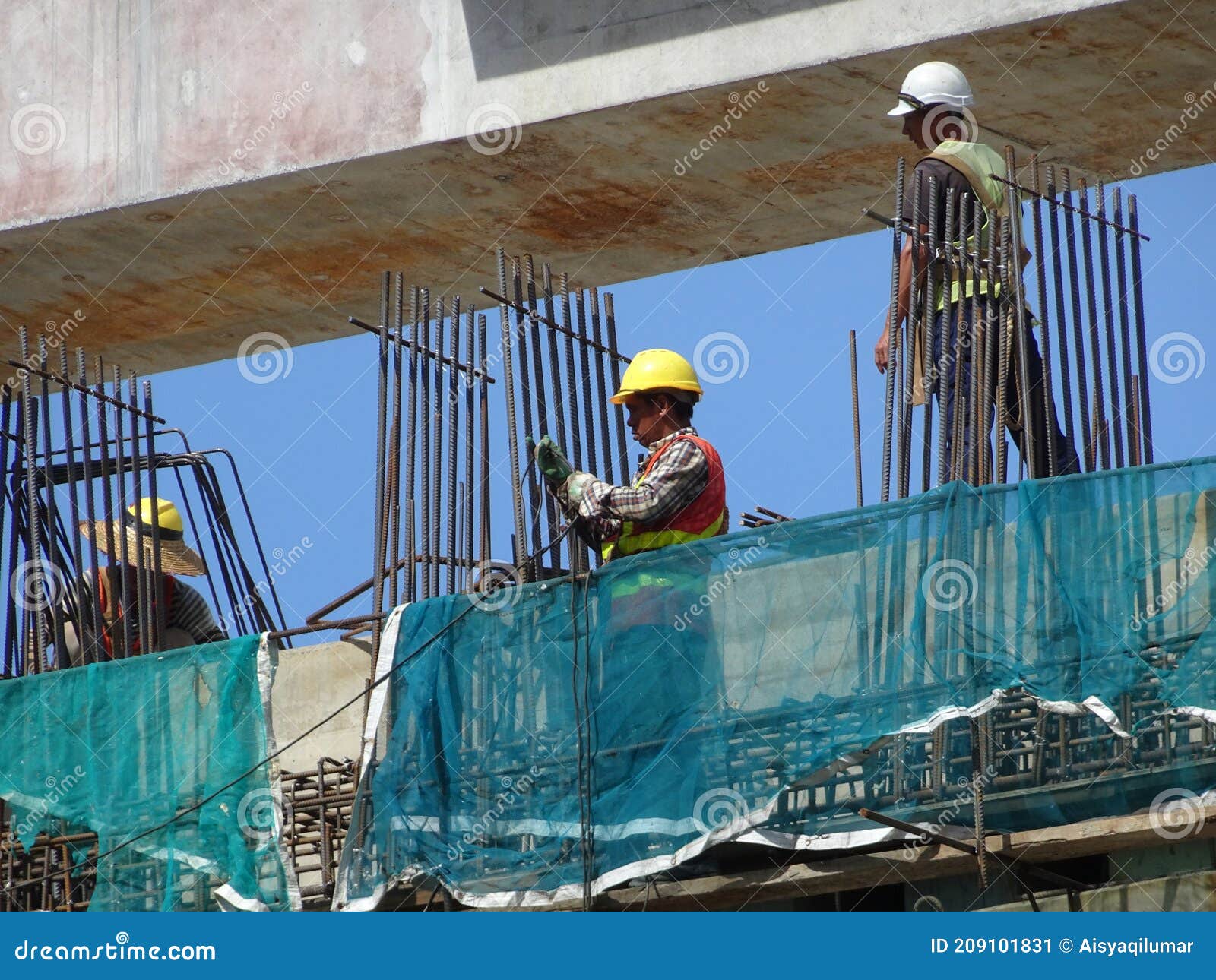 Construction Workers Working at Height at the Construction Site ...