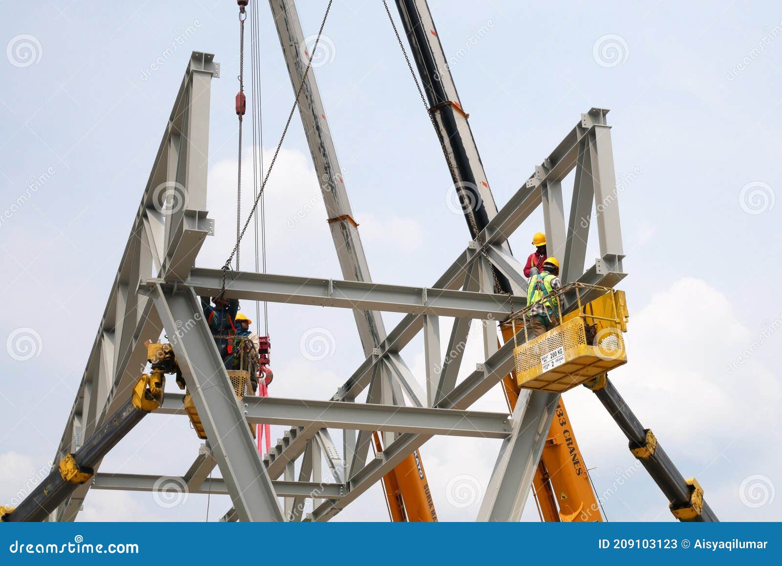 Construction Workers Working at Height at the Construction Site ...