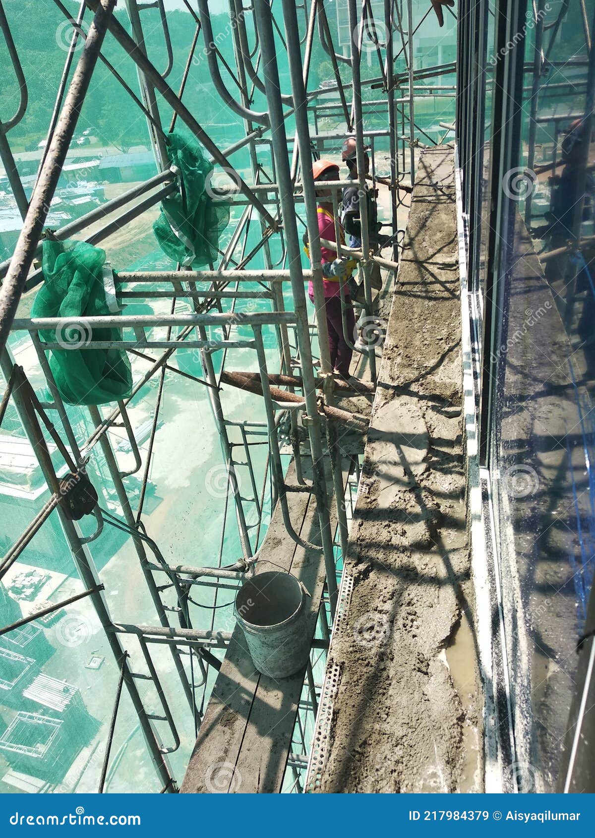 Construction Workers Working at Height at the Construction Site ...