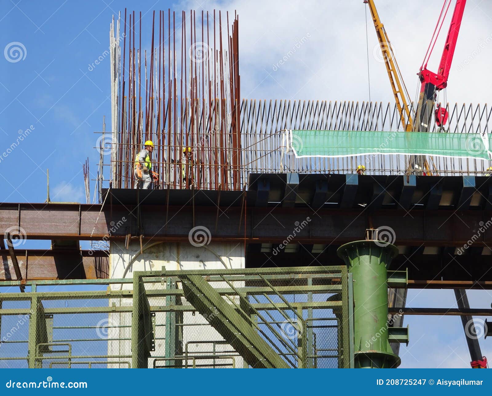 Construction Workers Working at Height Install Reinforcement Bars at ...