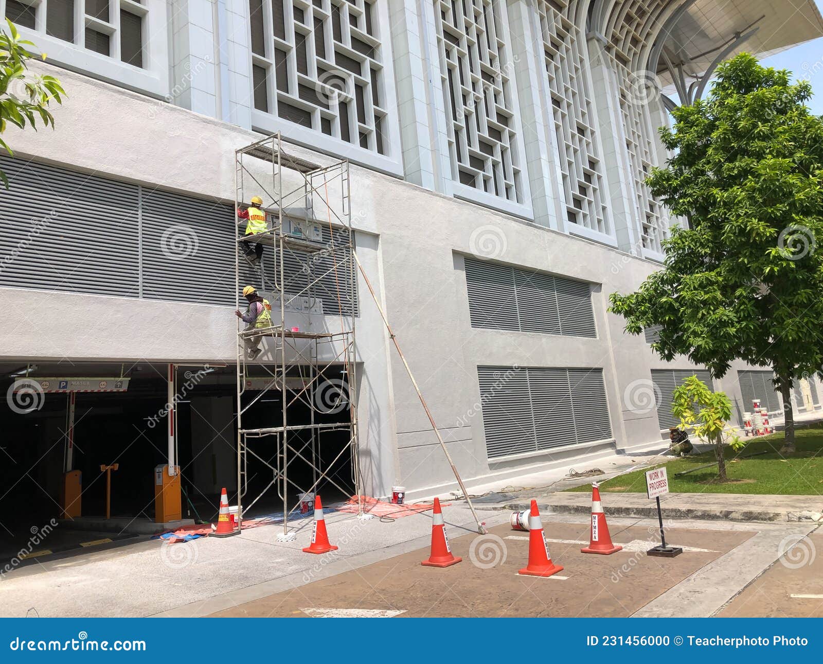 Construction Workers Working at High Place. Sunny Day Stock Photo ...