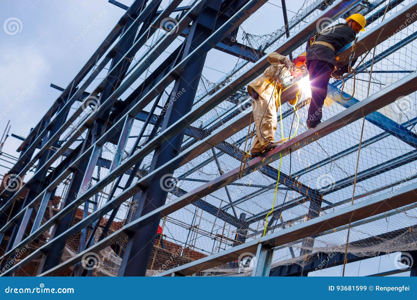 Construction Workers Installing Electrical Cable Tray And Doing Wiring ...