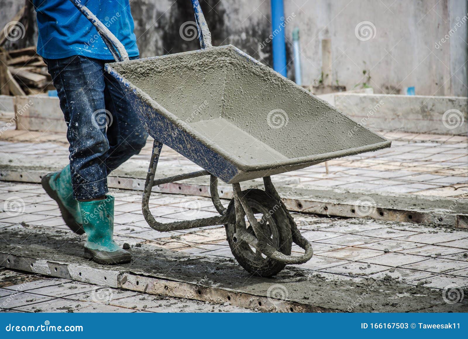 Construction Workers are Working on the Job Site with a Cement Cart ...