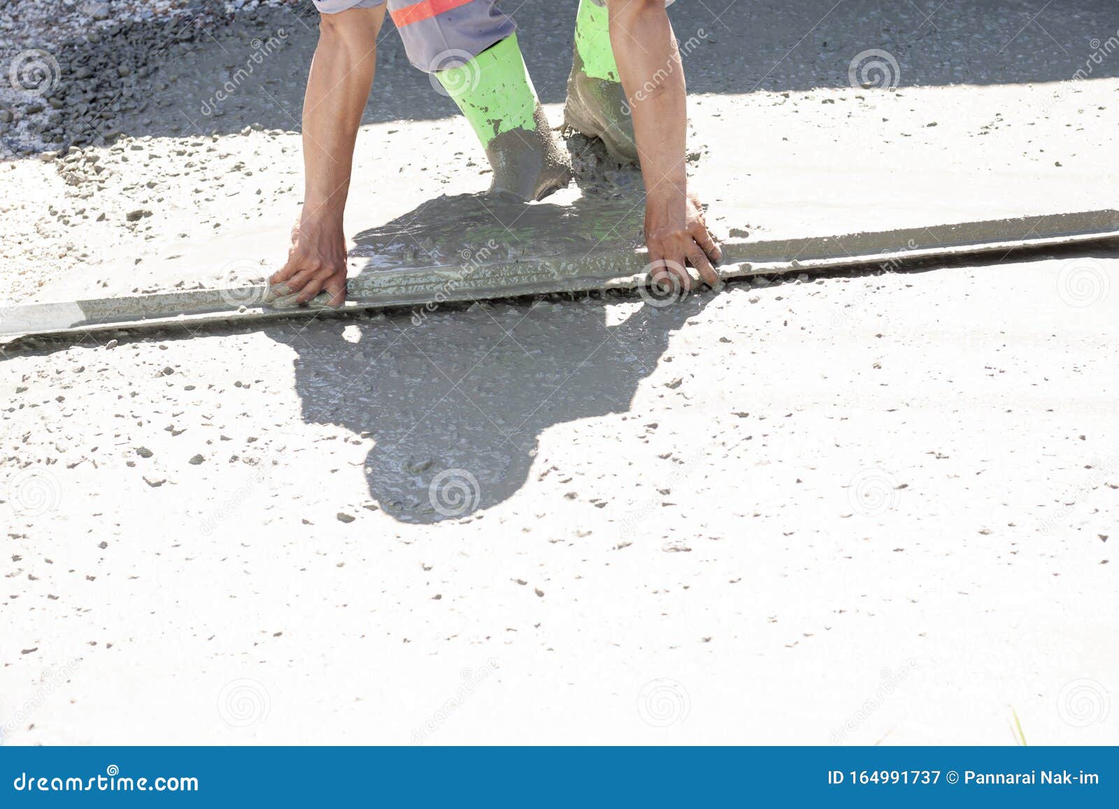 Construction Workers are Working by Leveling the Concrete Floor Smooth ...