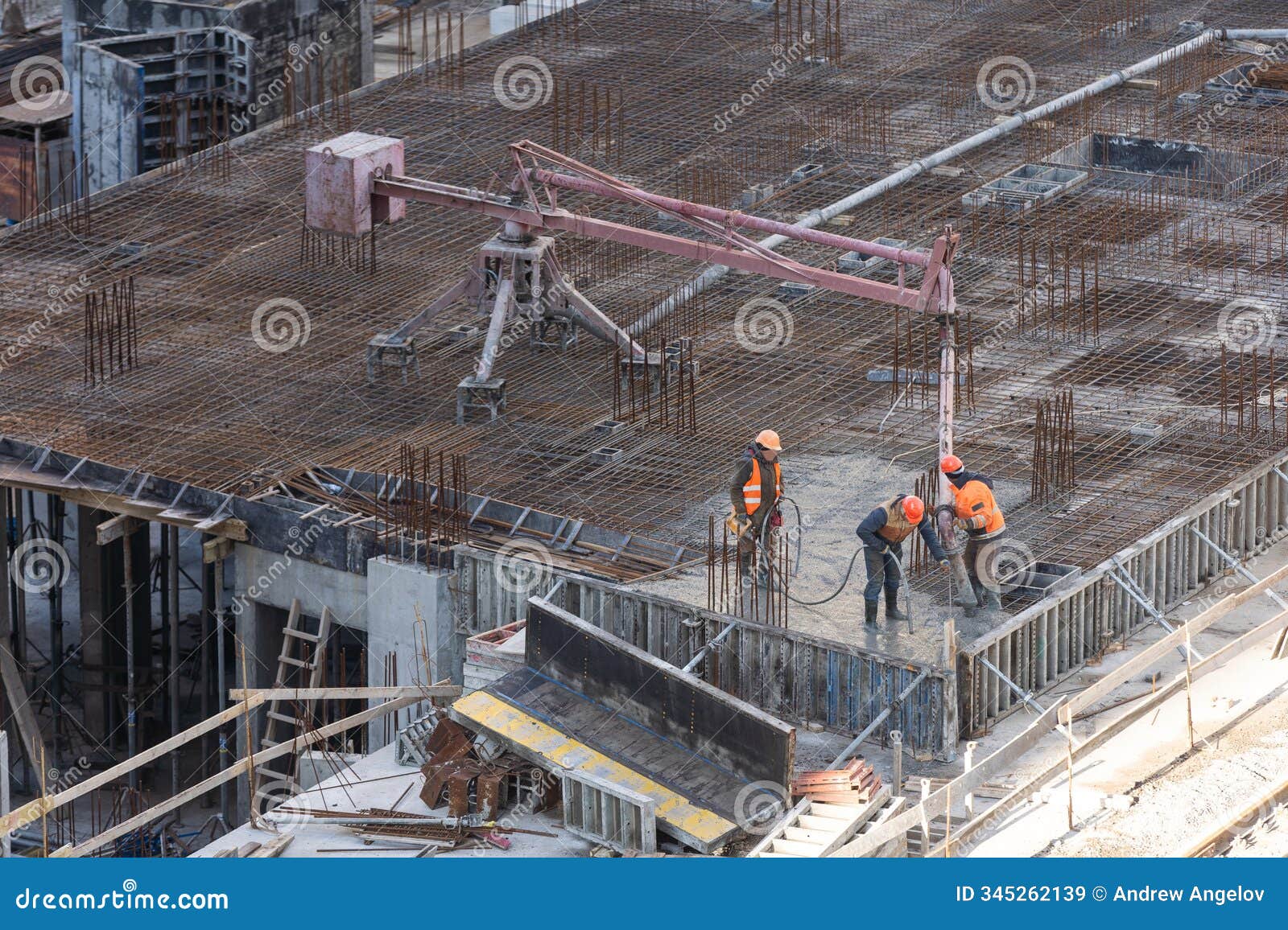 Construction Workers Working on Construction Machine. Aerial Platform ...