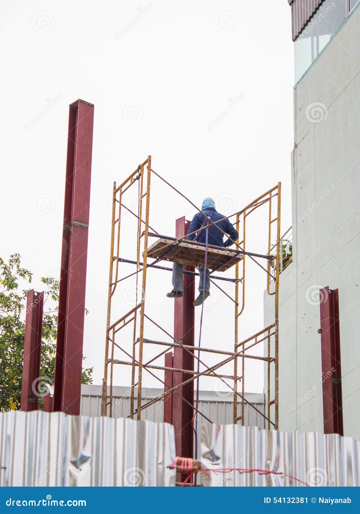 Construction Workers Working on Scaffolding Stock Image - Image of ...