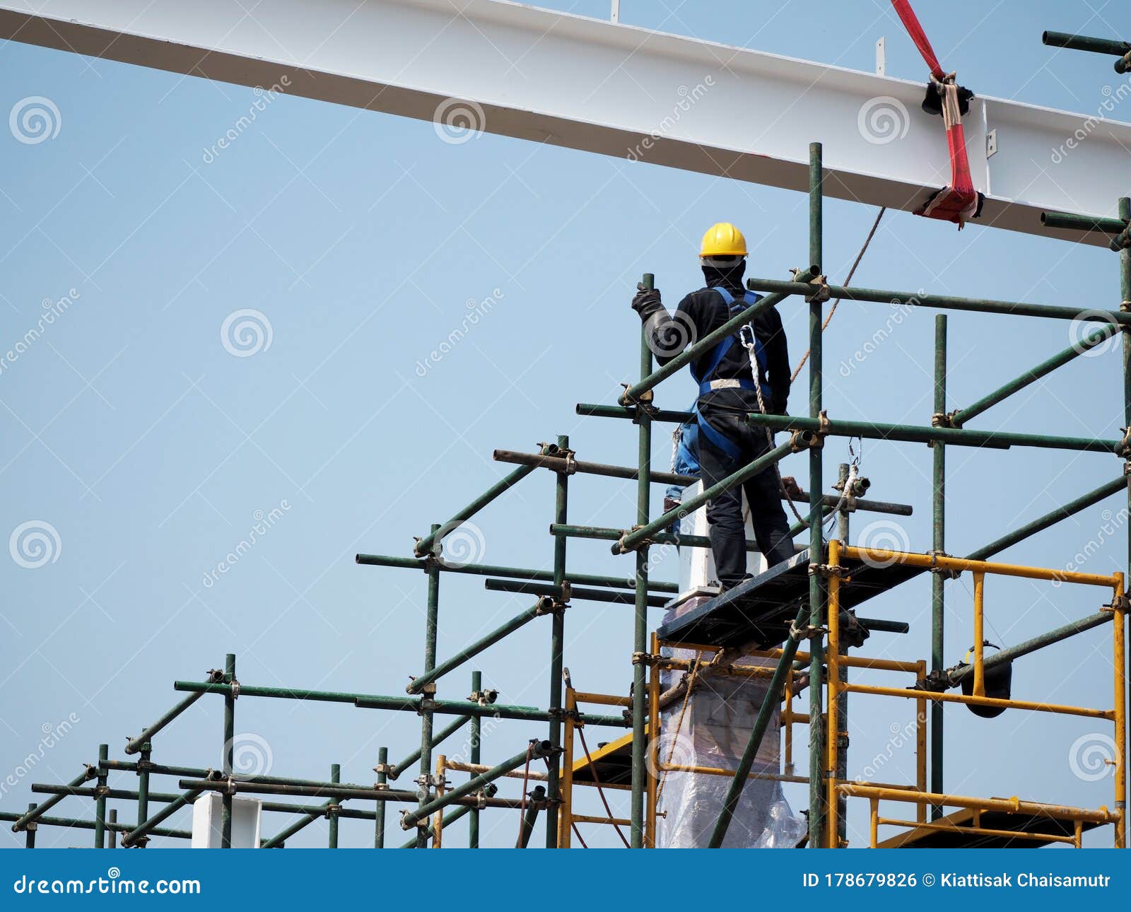 Man Working on the Working at Height on Construction Stock Photo ...