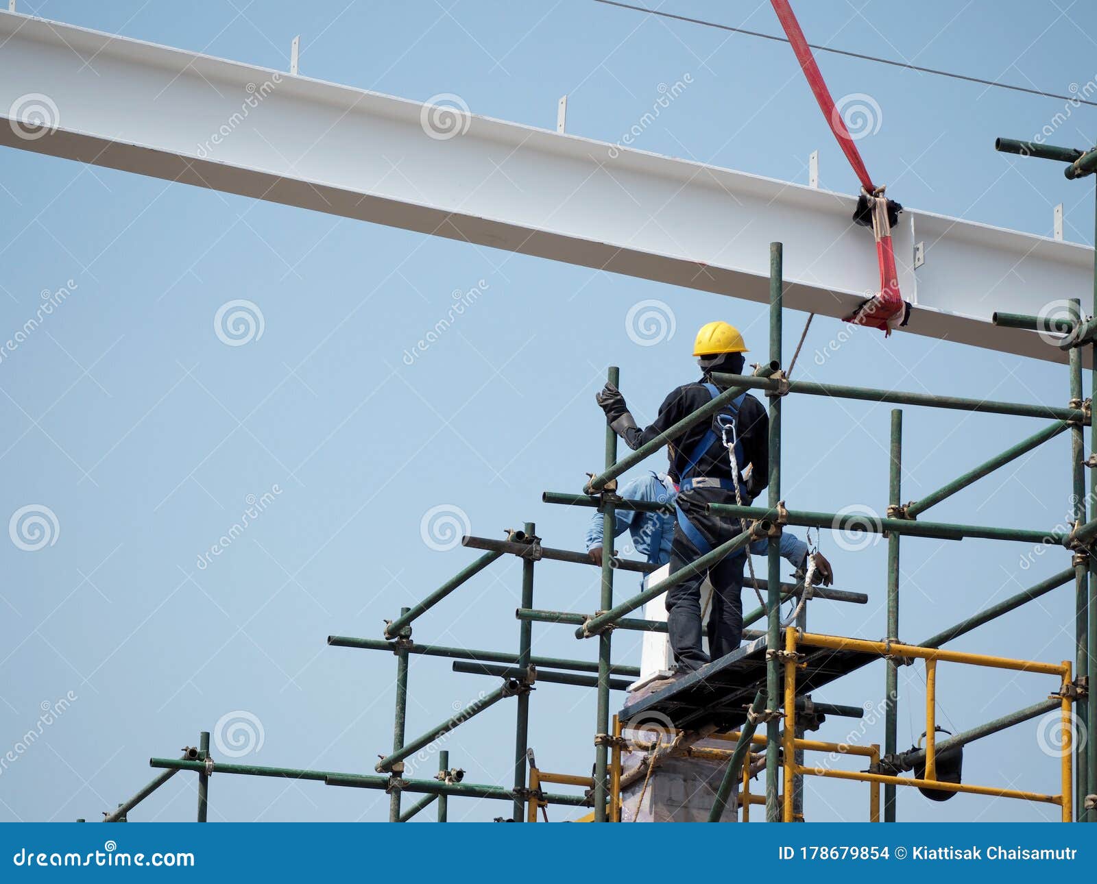 Man Working on the Working at Height on Construction Stock Photo ...