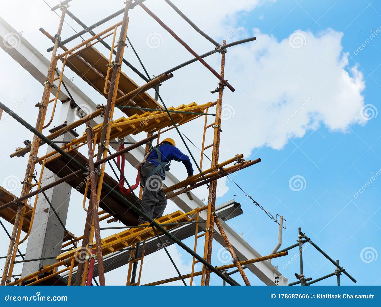 Man Working on the Working at Height on Construction Stock Photo ...