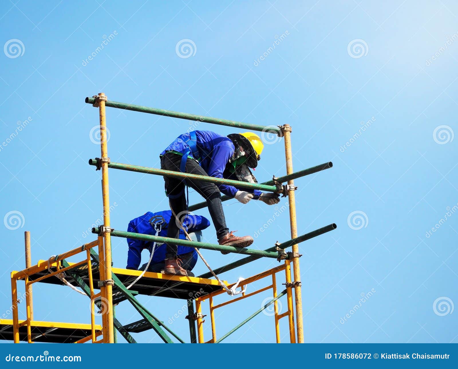Man Working on the Working at Height on Construction Stock Photo ...