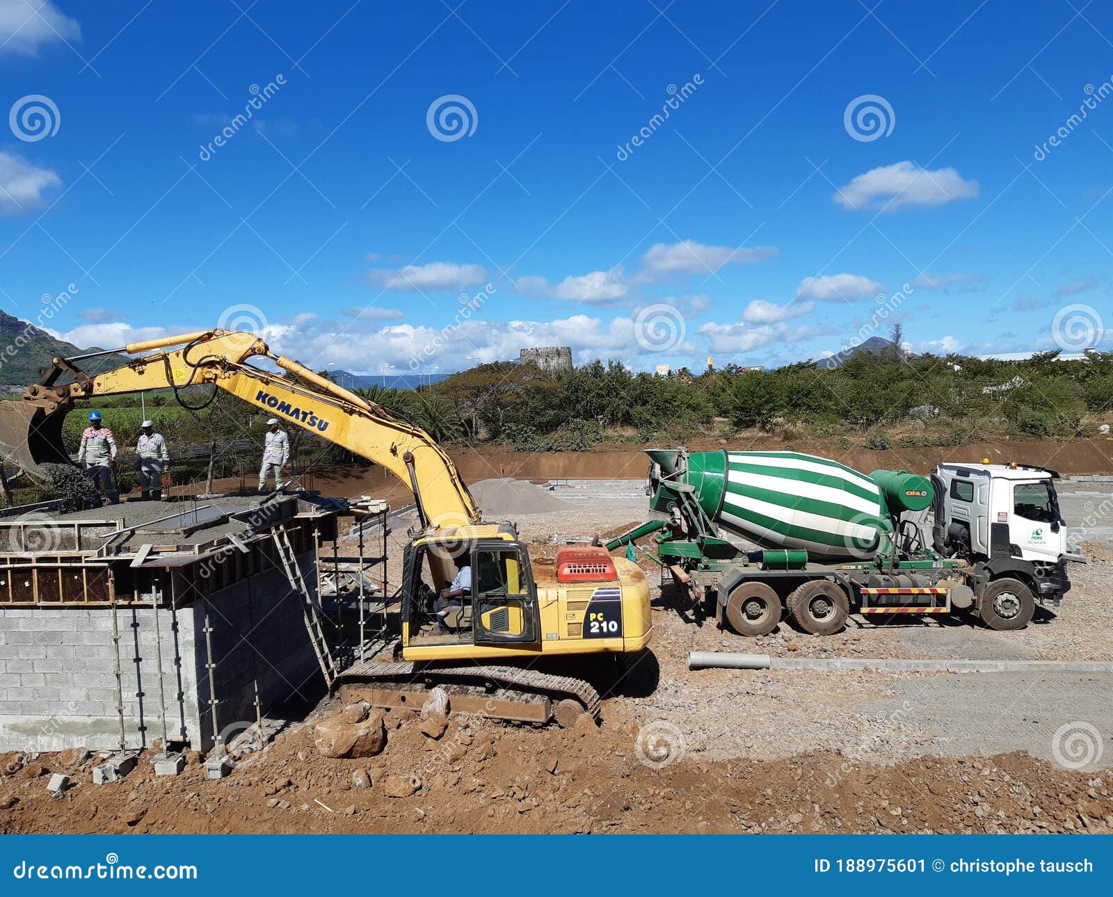 Construction Works Ongoing, Worksite with Workers and Heavy Machines ...