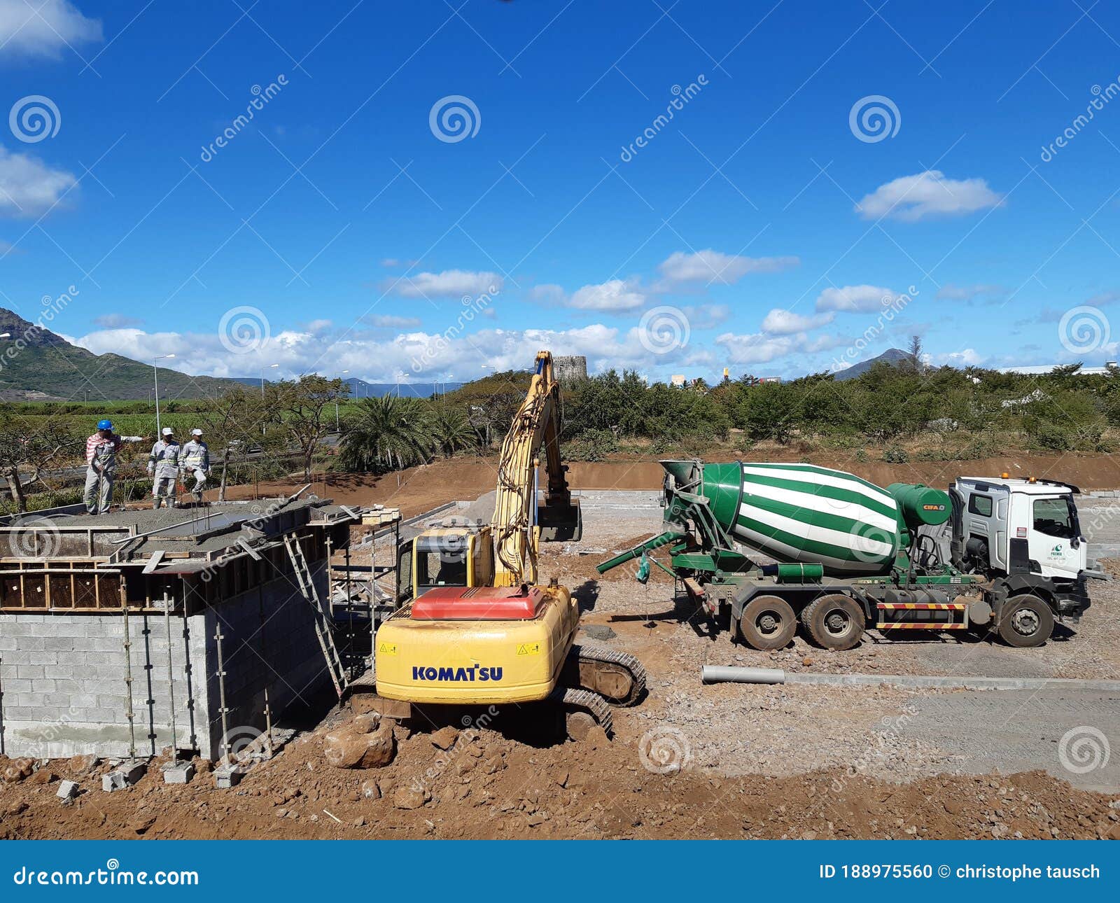 Construction Works Ongoing, Worksite with Workers and Heavy Machines ...