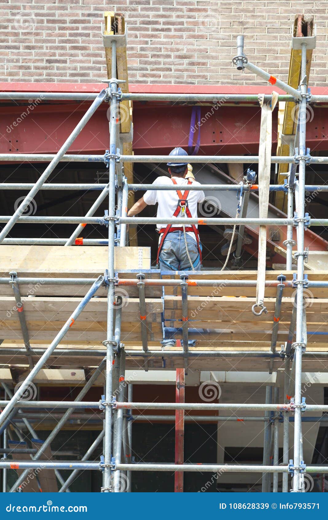 Constructionworker Busy with the Renovation of a Building Editorial ...