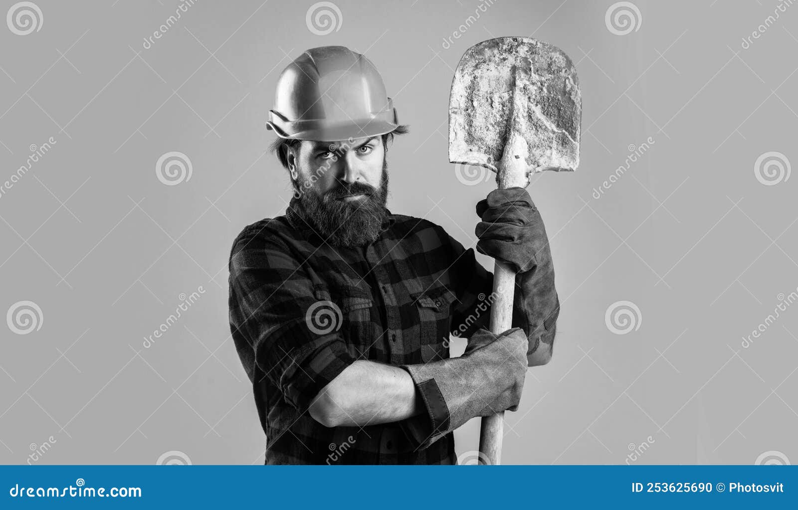 Constructor De Hombres Brutales Con Uniforme Y Casco Con Arquitectura De Palas Foto de archivo ...