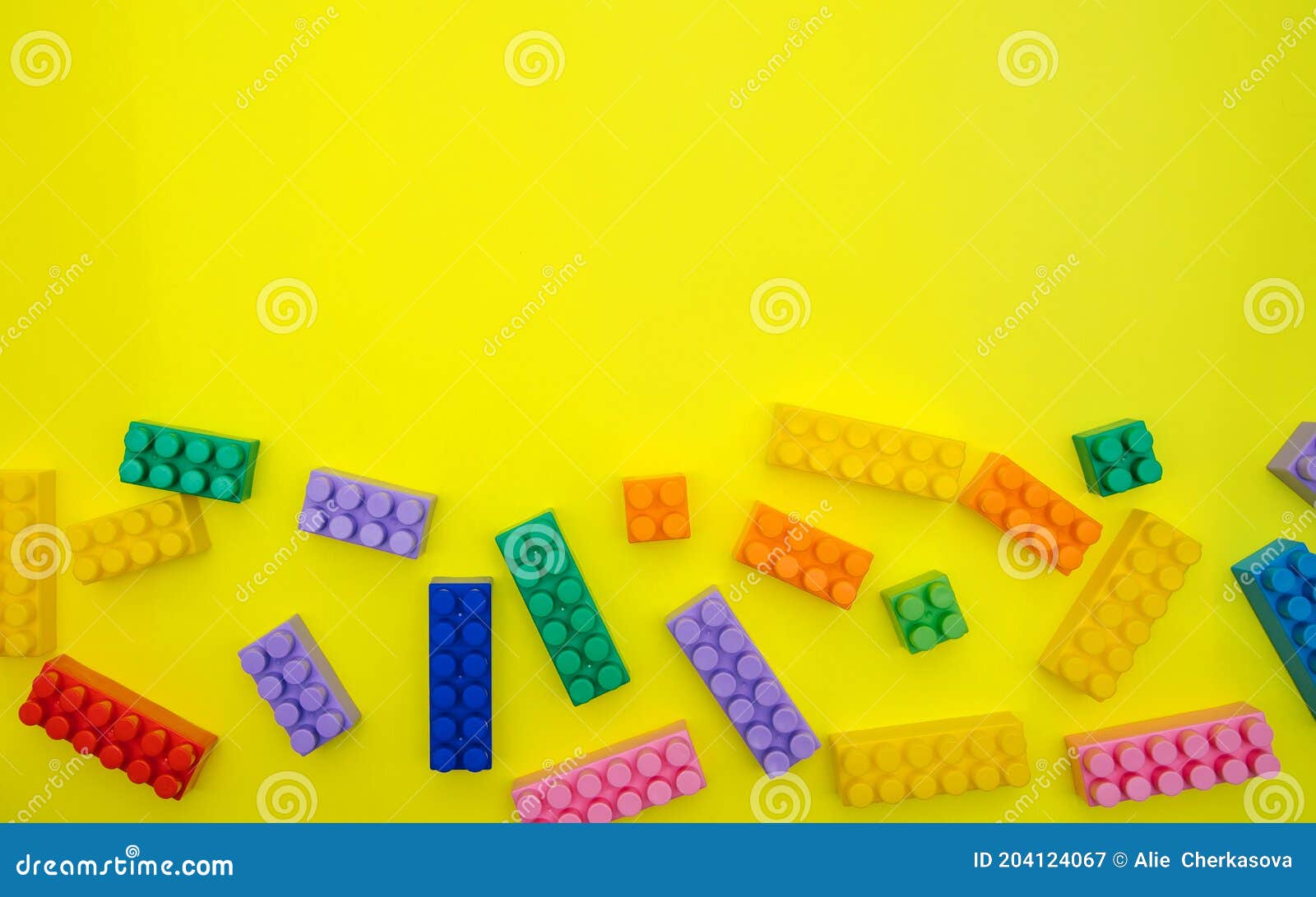 Constructor Details are Scattered on a Yellow Background. Multi-colored ...