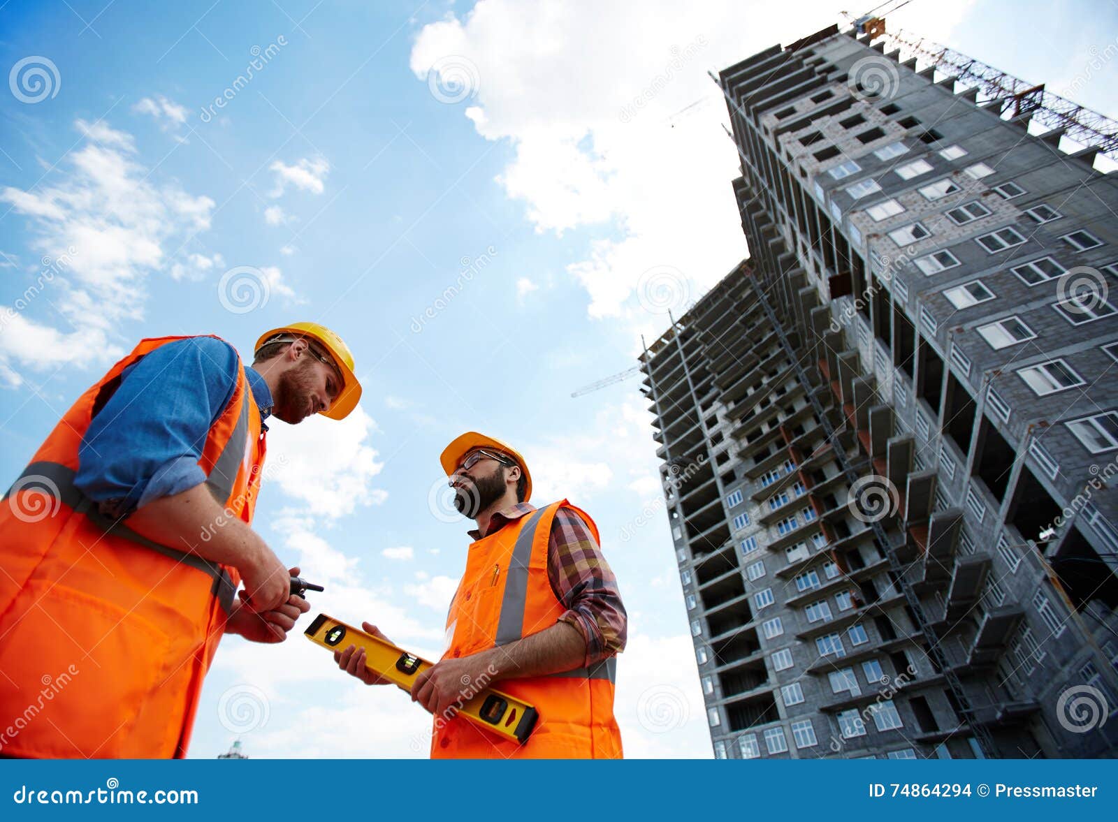 Constructors talking stock photo. Image of teamwork, structure - 74864294