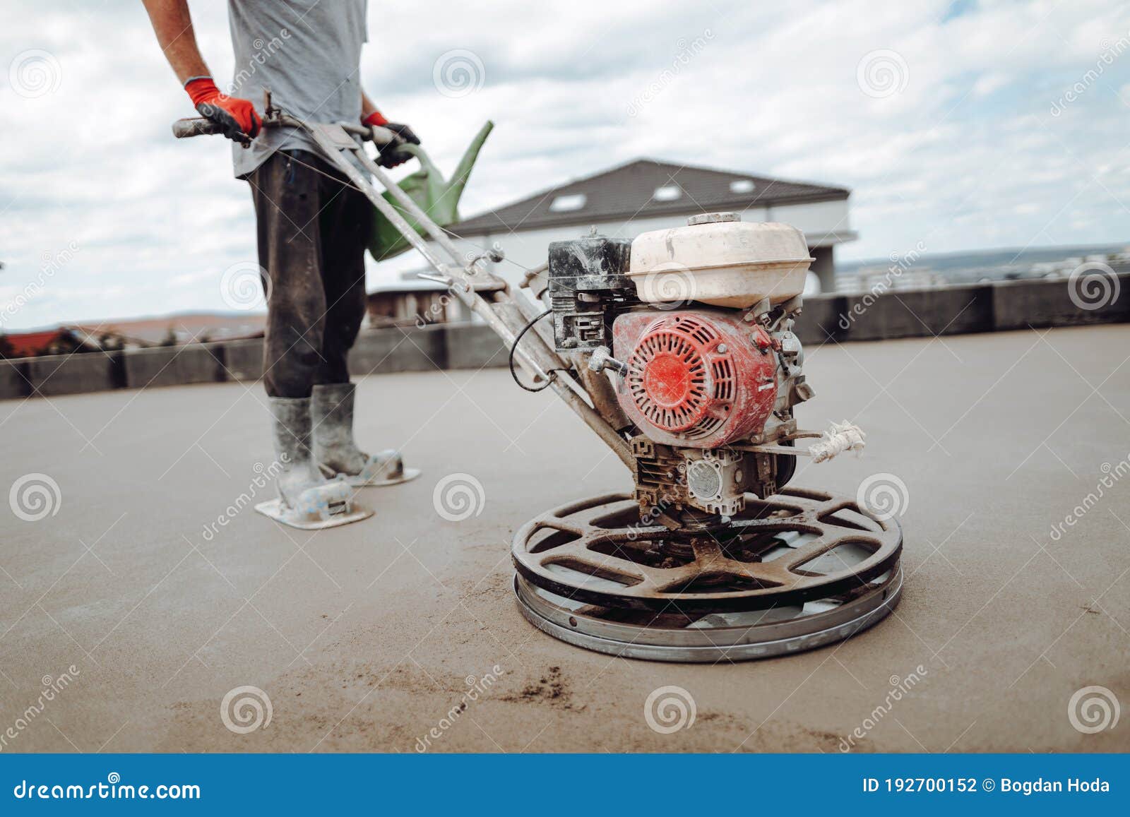 Constrution Site Worker Using Helicopter Power Tool and Polishing Sand ...