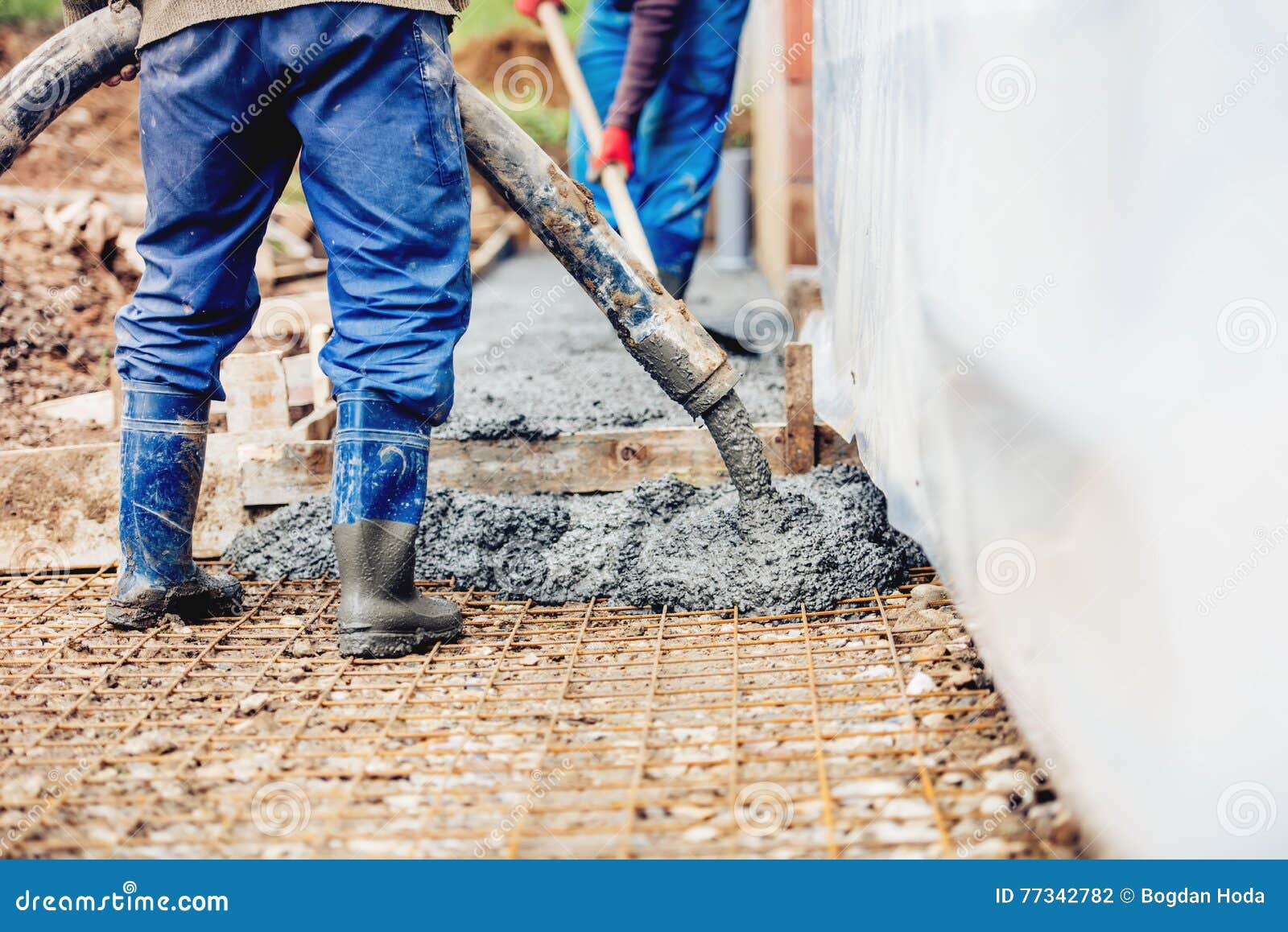 Constuction Details - Worker Laying Cement Or Concrete With Automatic ...