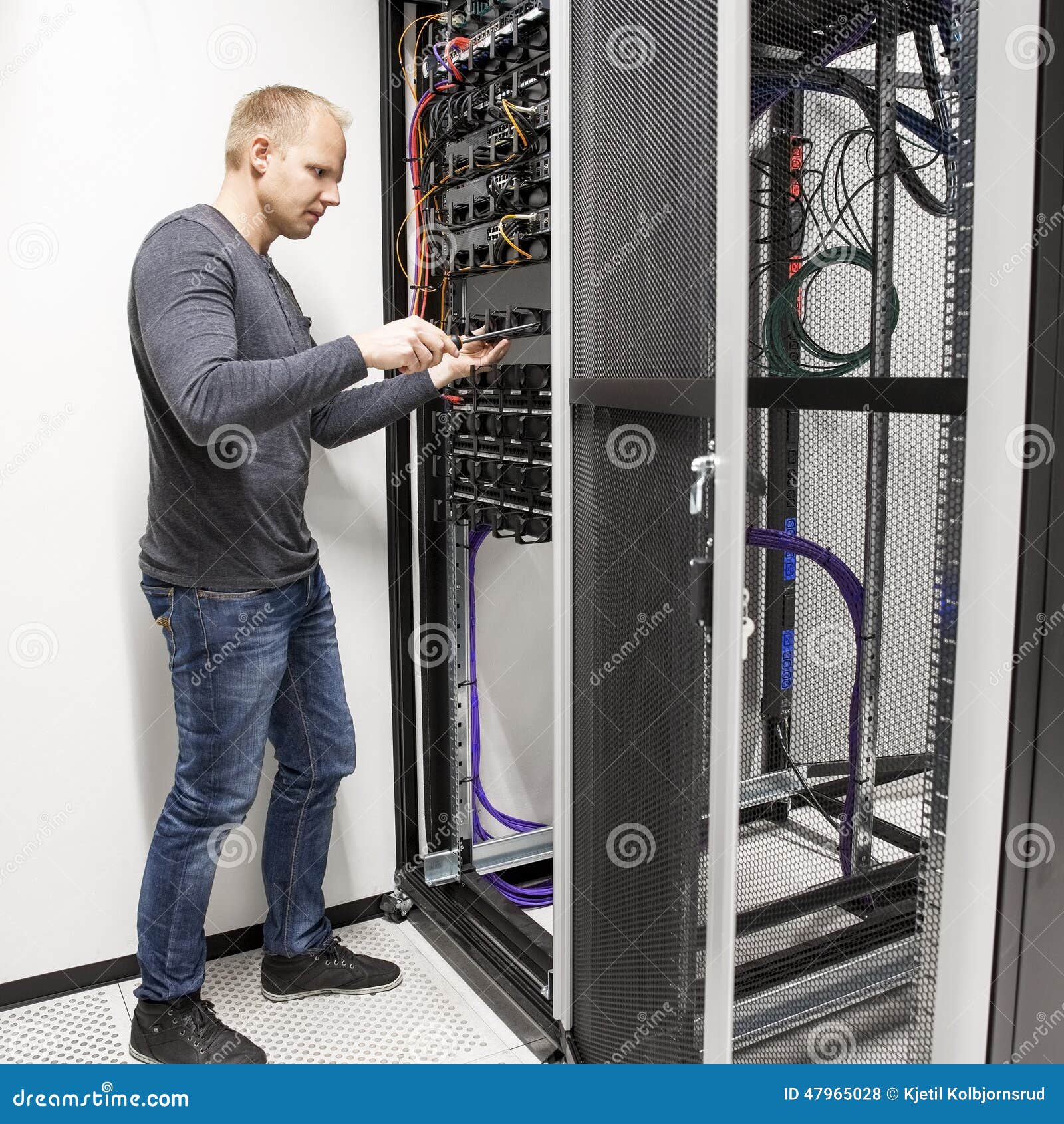 It Consultant Building Network Rack in Datacenter Stock Photo - Image ...