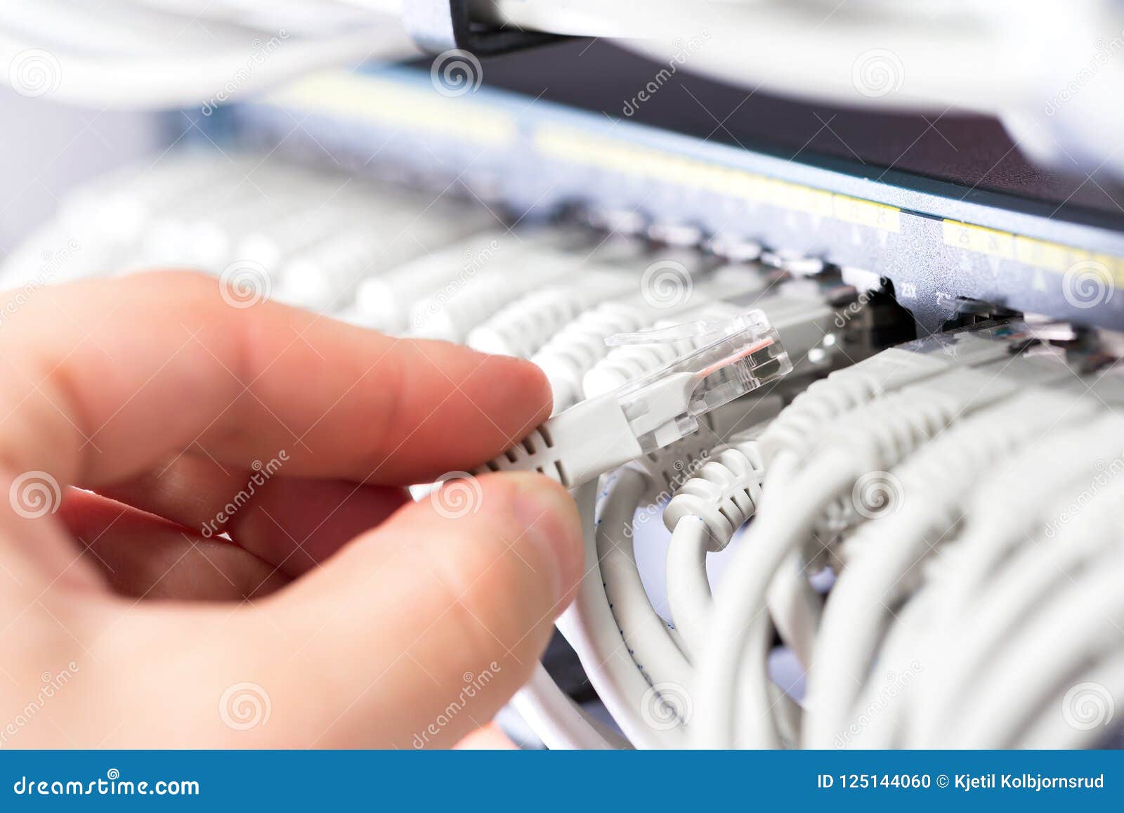 The Engineer Connects The Optical Wire To The Central Router. The ...