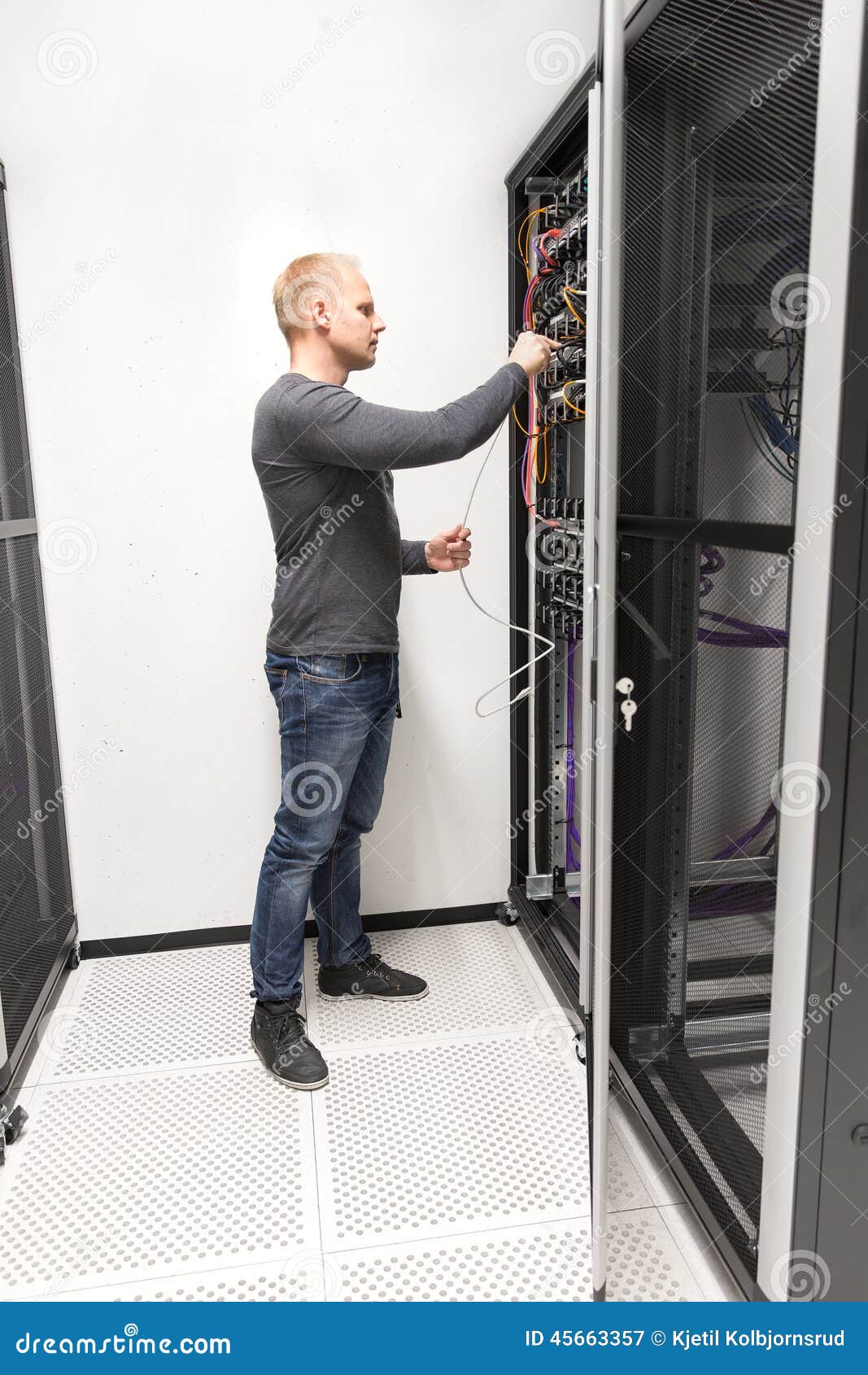 It Consultant Installs Network Rack in Datacenter Stock Image - Image ...