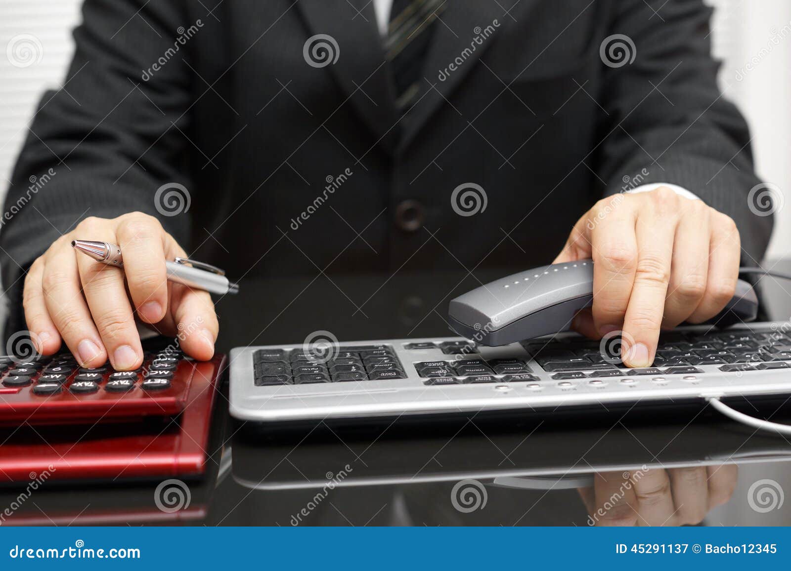 Consultant is Working on Computer and Calling Client Stock Image ...