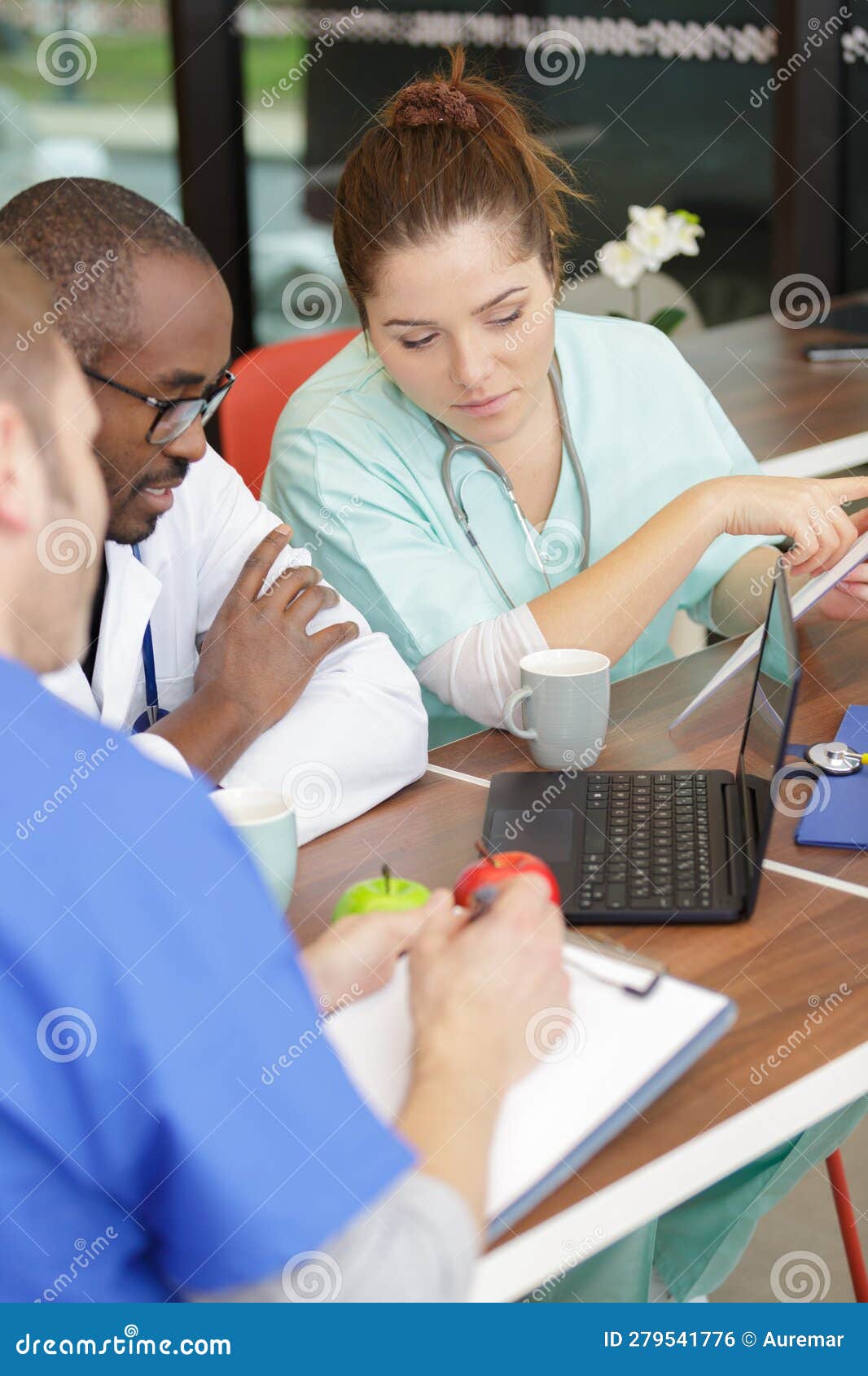 Consultation between Team Doctors Stock Photo - Image of talking, professionaloccupation: 279541776