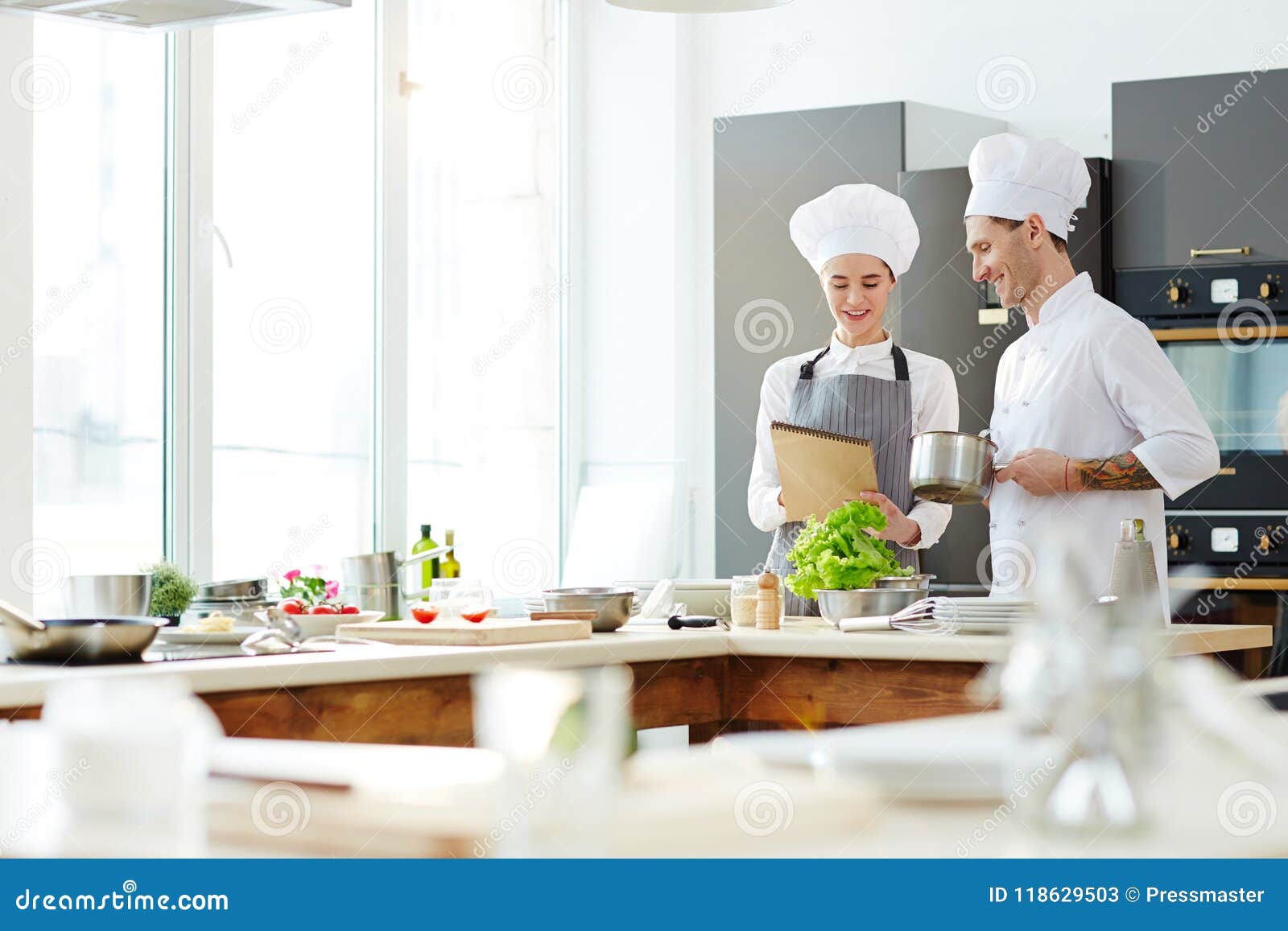 Consulting about cooking stock image. Image of cuisine - 118629503