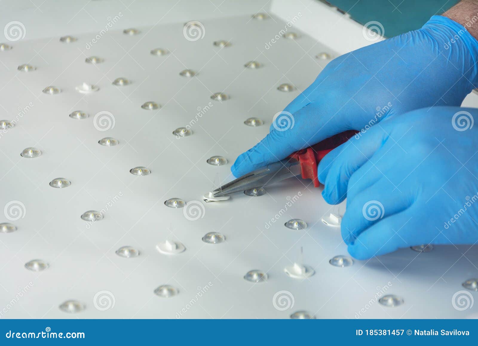 A Consumer Electronics Engineer Removes the LED Panel on an LCD TV ...