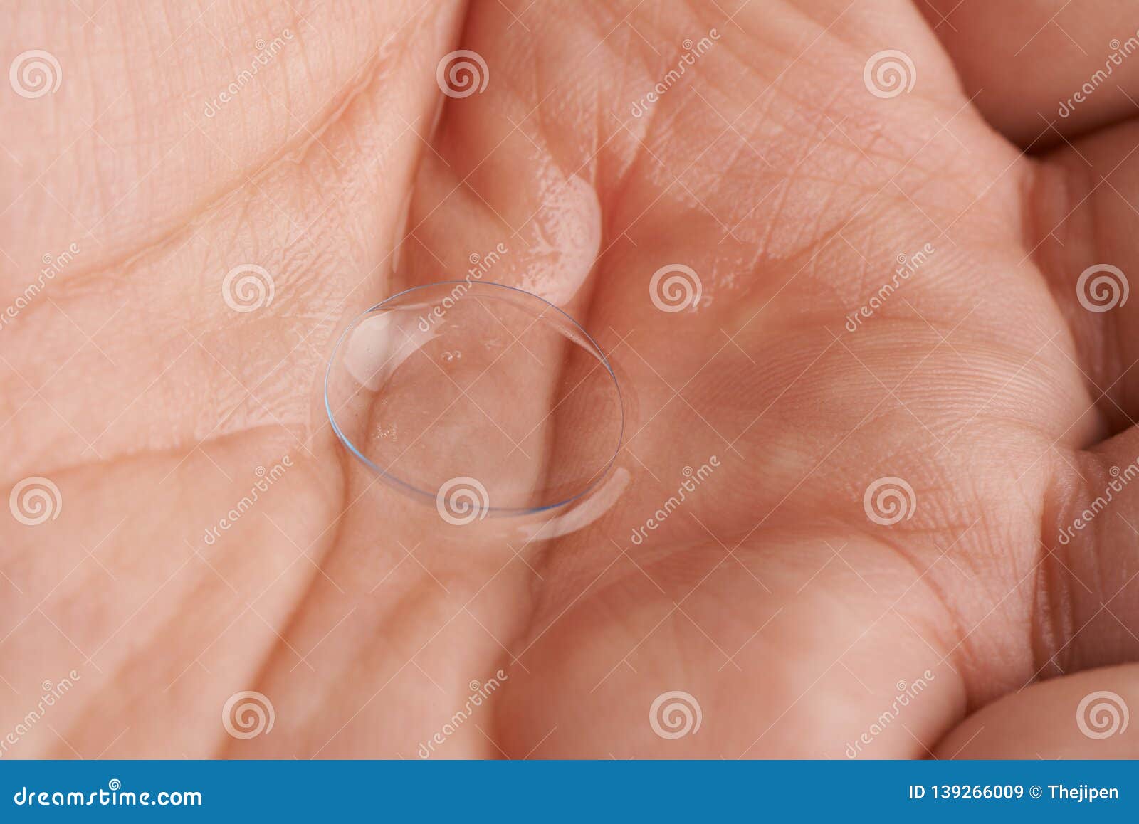 Contact lens on a hand stock image. Image of silicone - 139266009