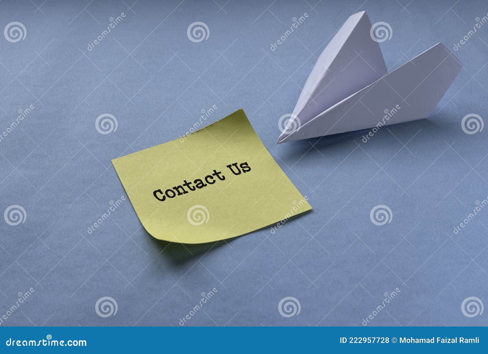Contact Us Concept Written on Yellow Memo Note with Paper Plane on Blue ...