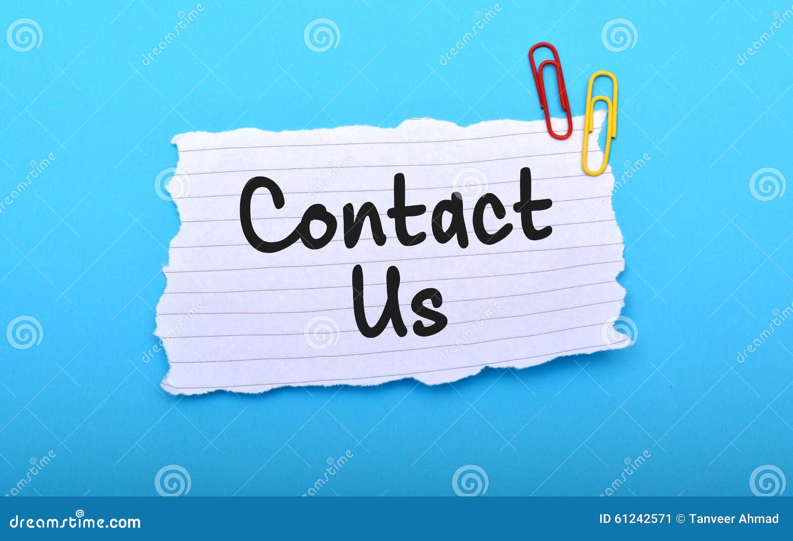 Contact Us Hand Written on Paper with Blue Background Stock Image ...