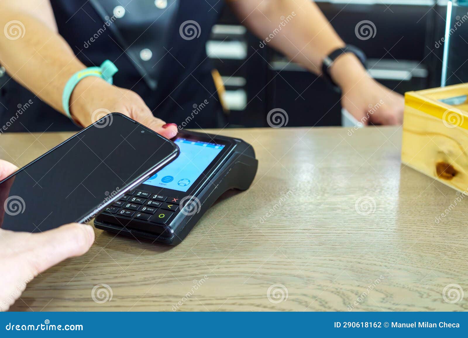 Contactless Payment by Smartphone. Payment with NFC Technology in a ...