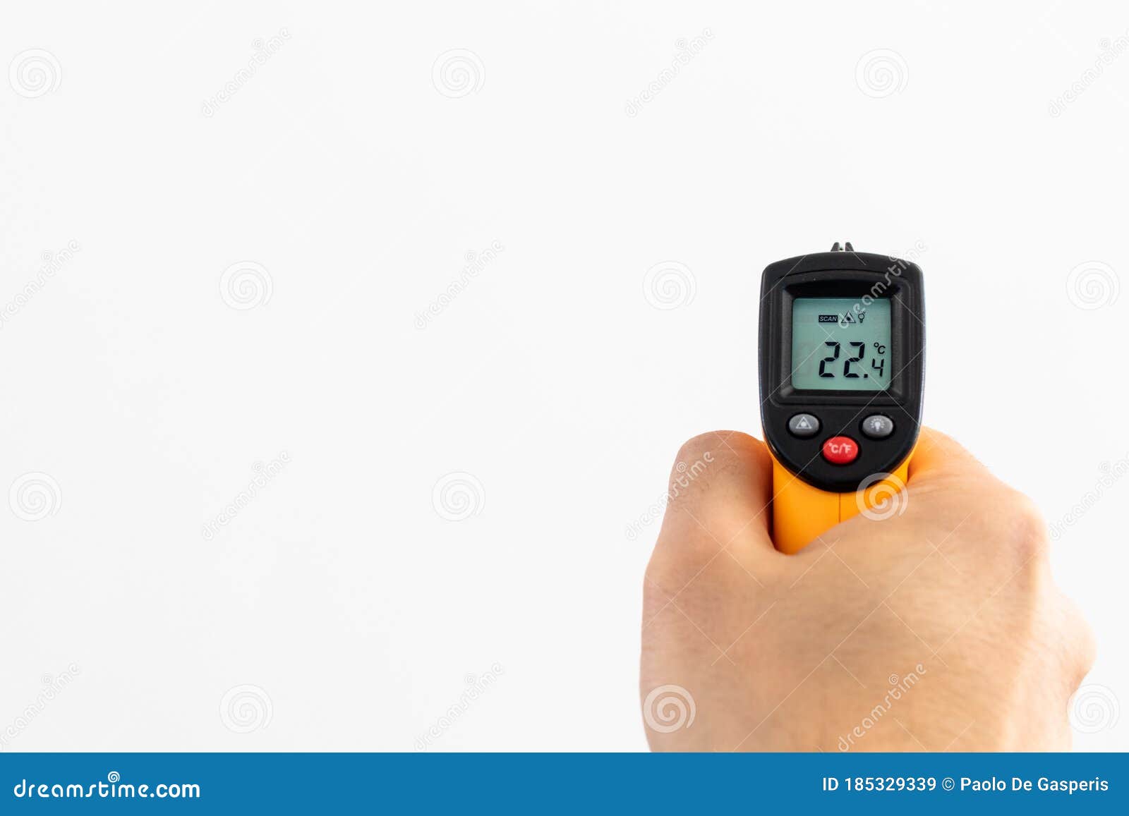 Contactless Thermometer Measuring with White Background and Copyspace ...