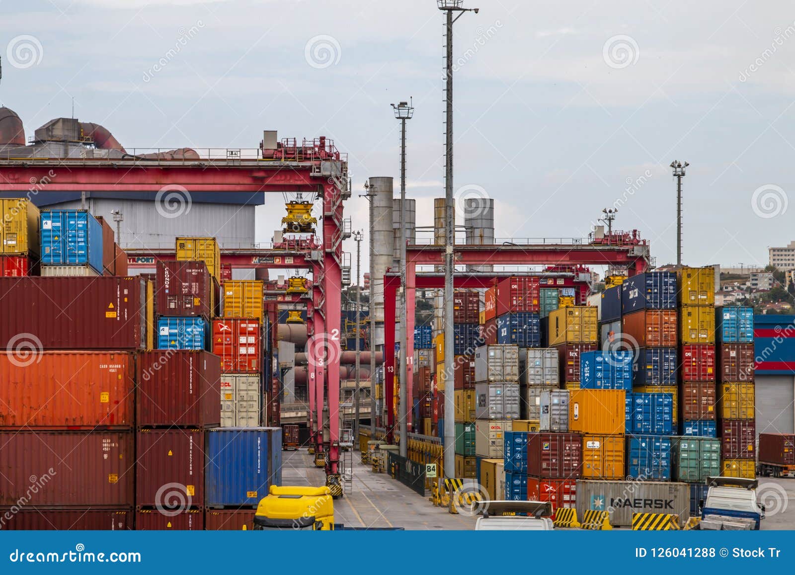 The Container Is Being Lowered From The Ship That Is Approaching The ...