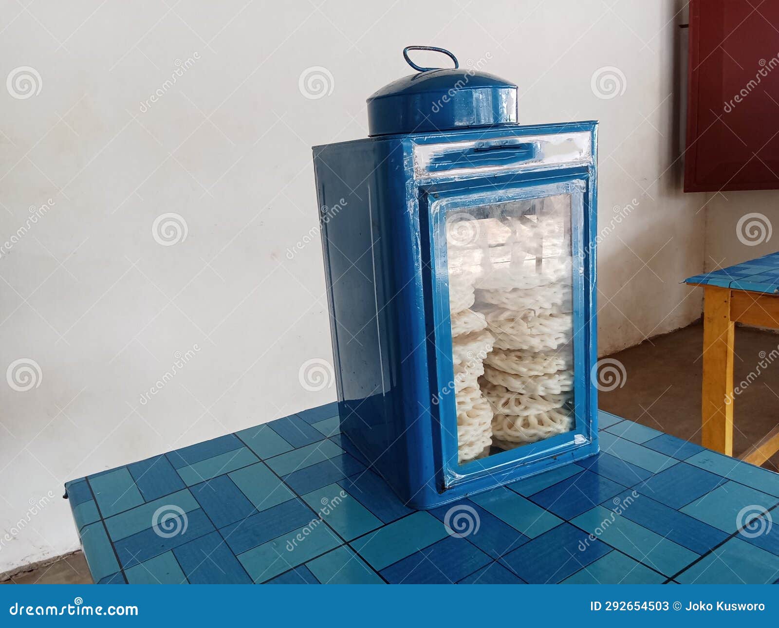 A Container of Blue Crackers on a Table Stock Image - Image of crackers ...