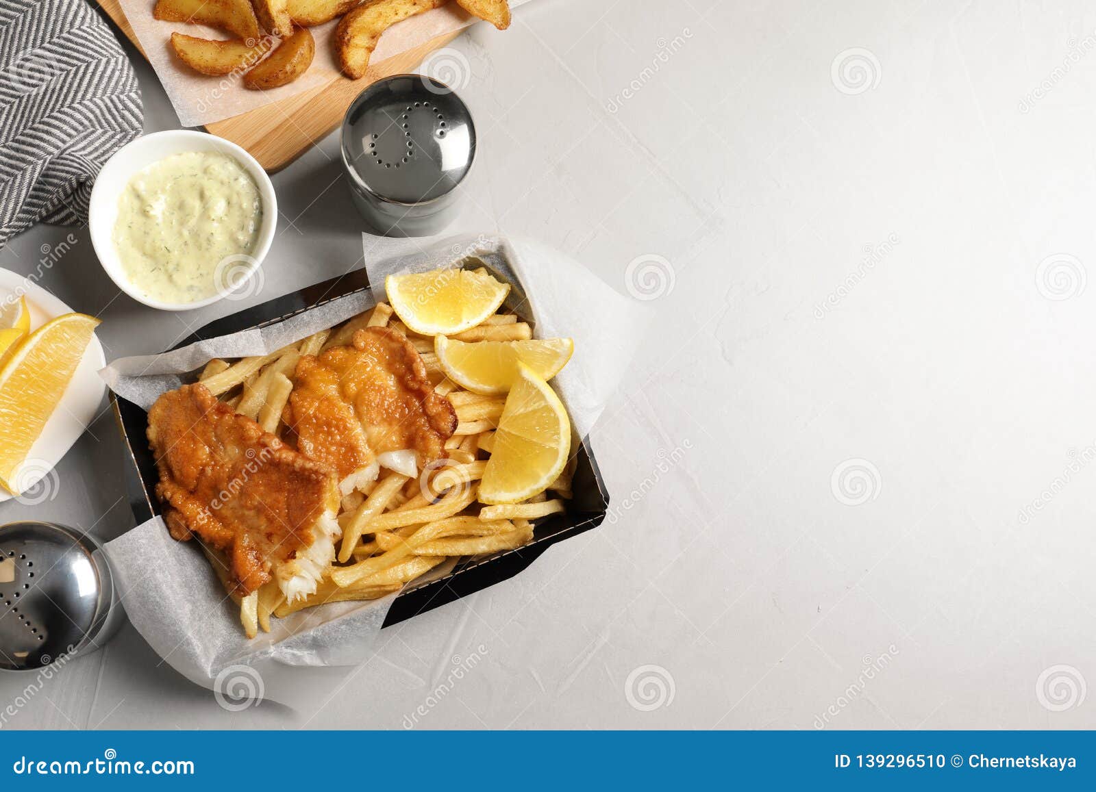 Container with British Traditional Fish and Potato Chips on Table, Top ...