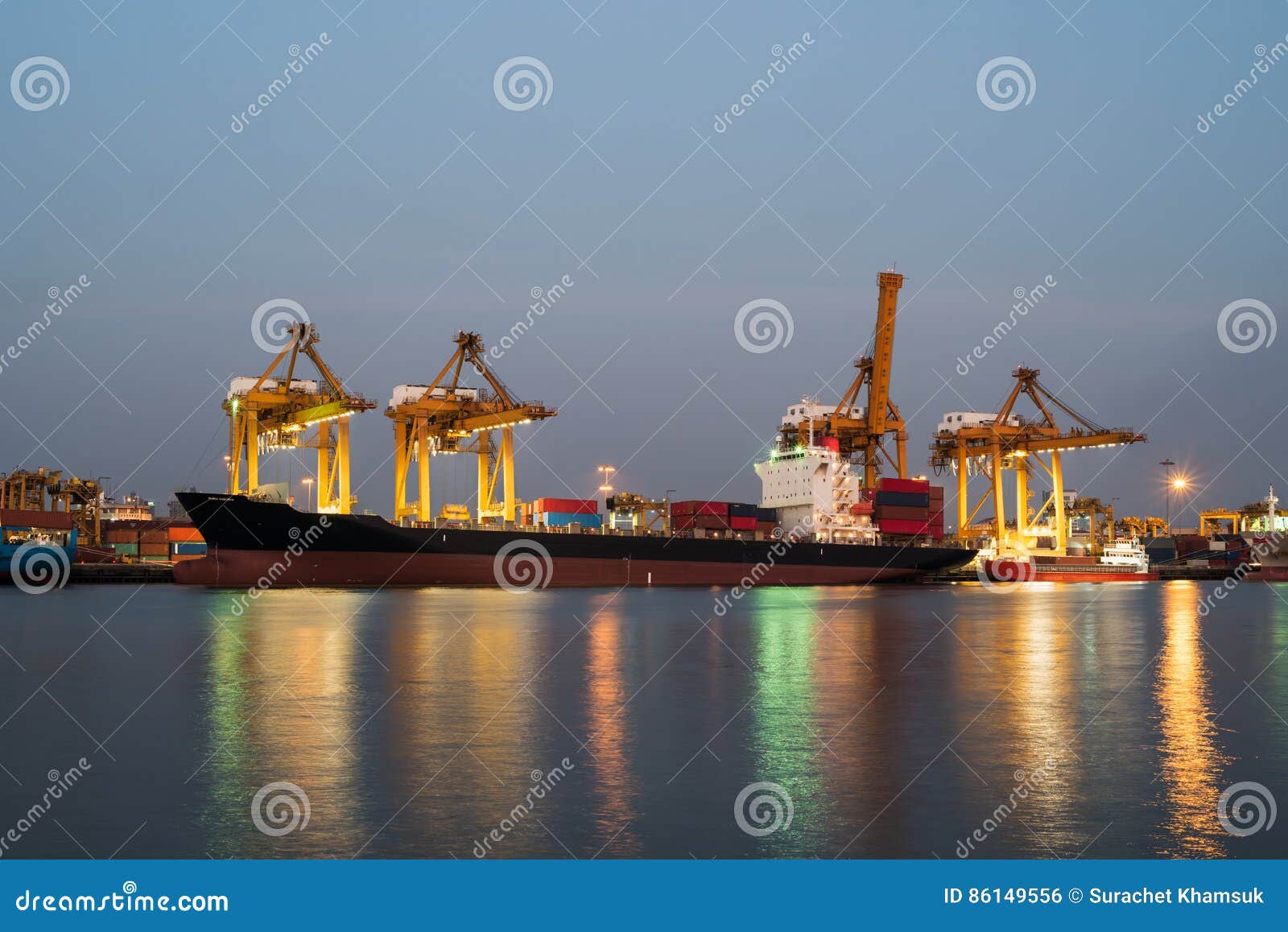 Container Cargo Freight Ship with Working Crane Bridge in Shipyard at ...