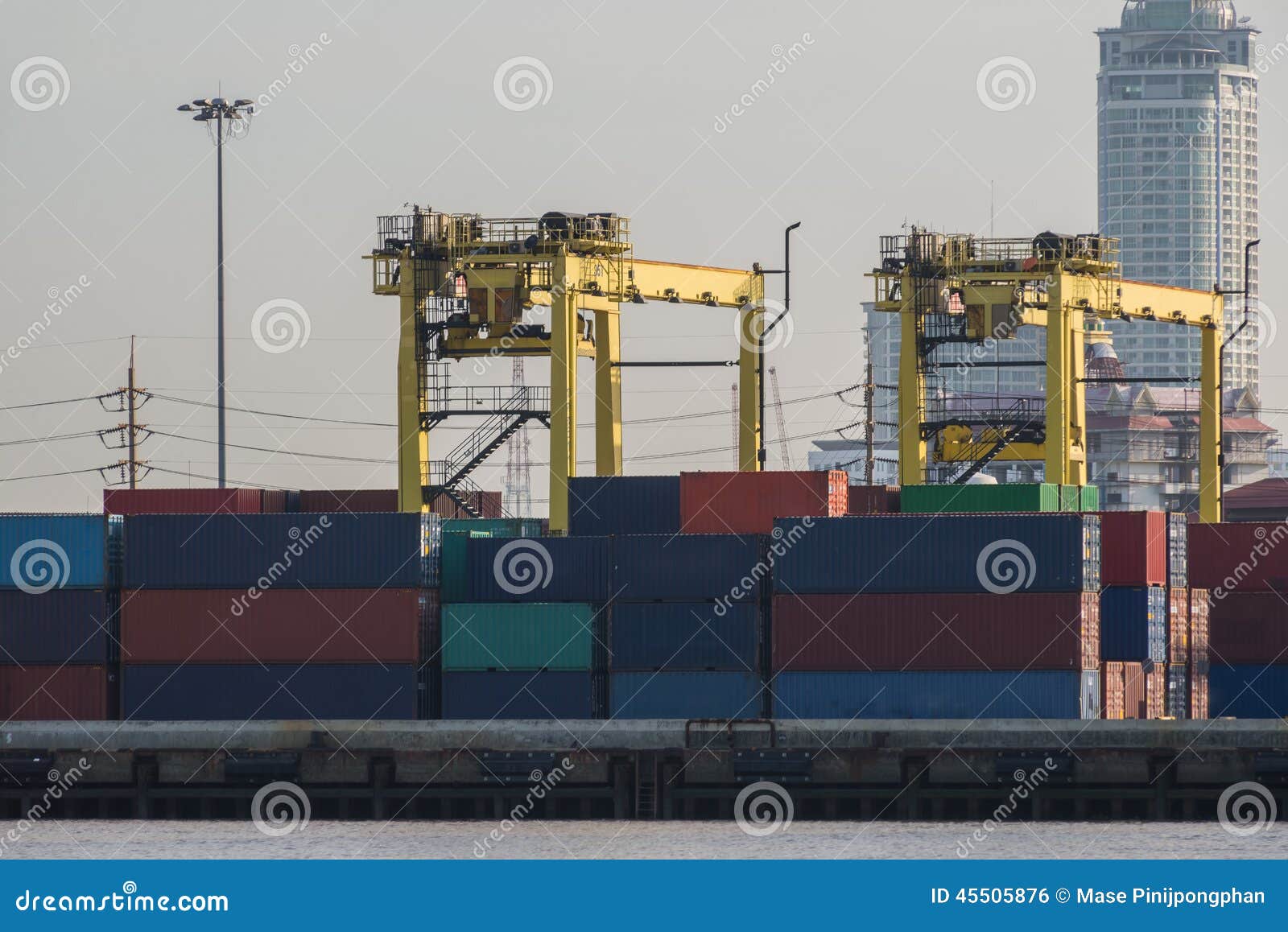 Container Cargo Freight Ship with Working Crane Bridge in Shipyard ...