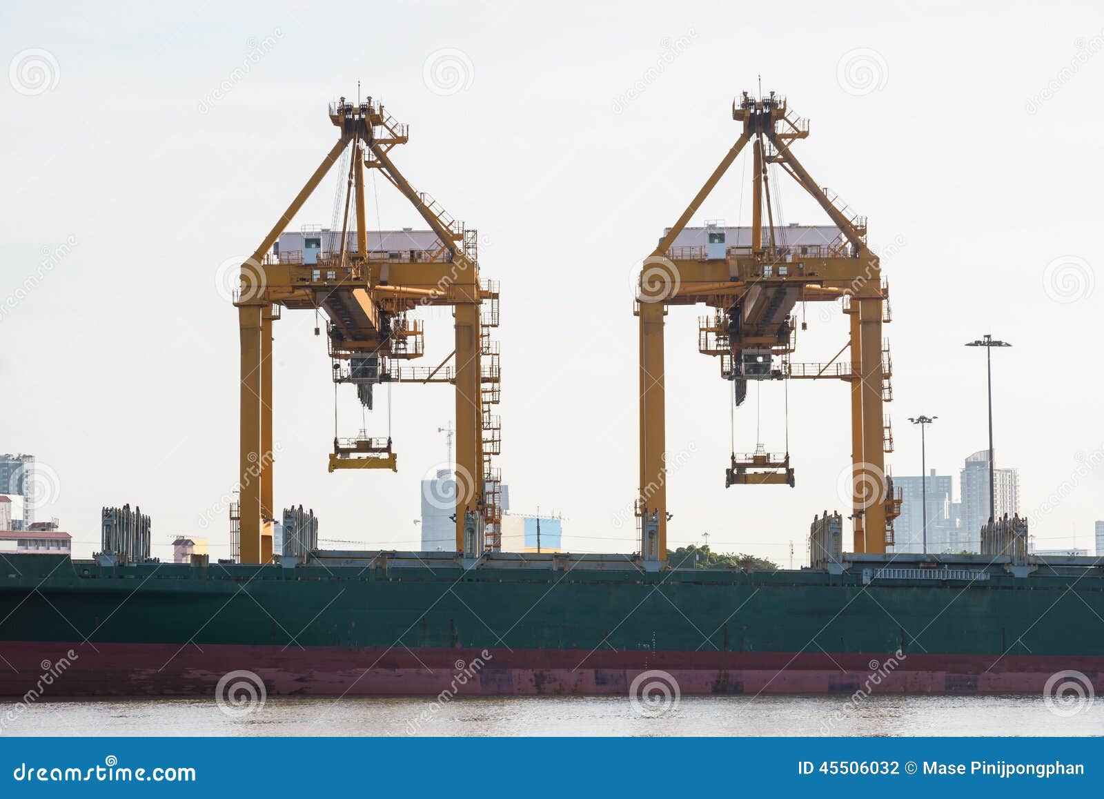 Container Cargo Freight Ship with Working Crane Bridge in Shipyard ...