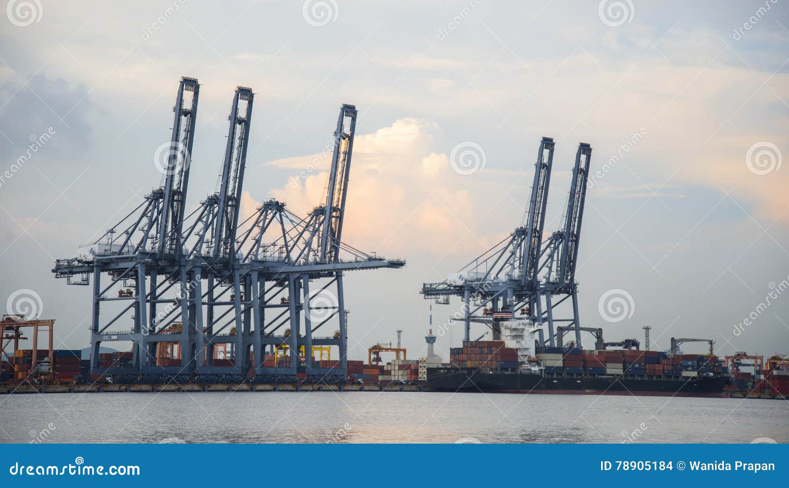 Container Cargo Freight Ship with Working Crane Bridge in Shipyard at ...