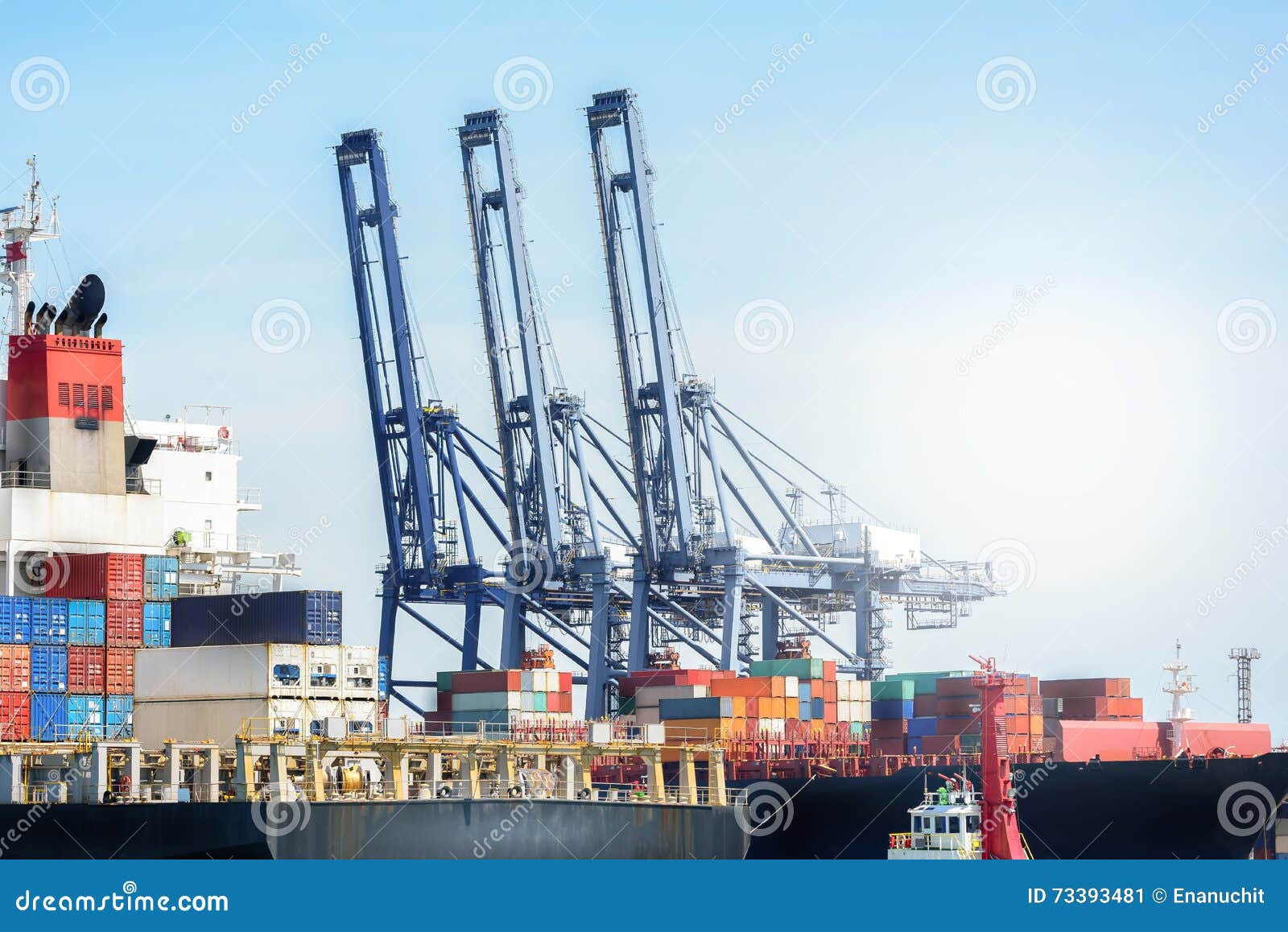 Container Cargo Freight Ship with Working Crane Bridge in Shipyard at ...