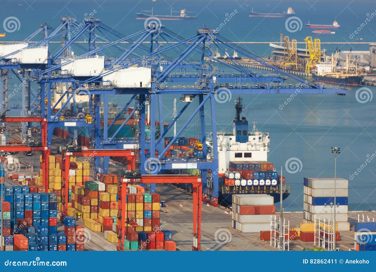 Container Cargo Freight Ship with Working Crane Loading Bridge I Stock ...