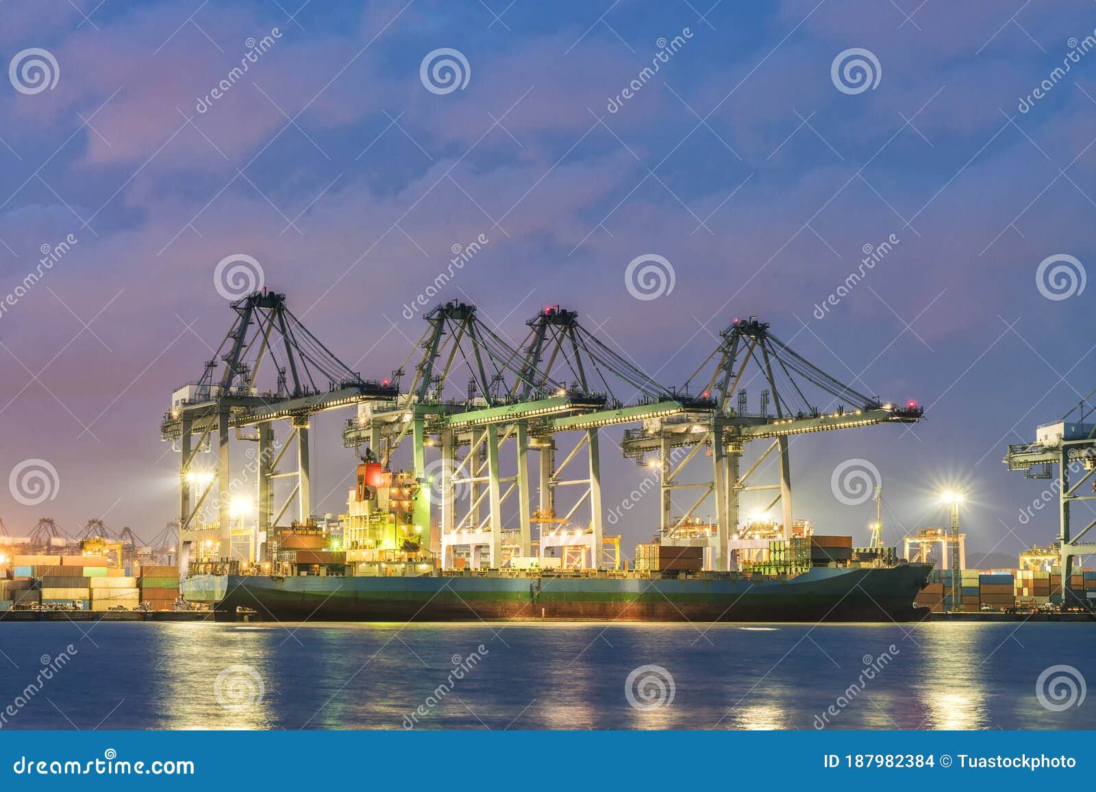 Container Cargo Freight Ship with Working Crane Loading Bridge in ...