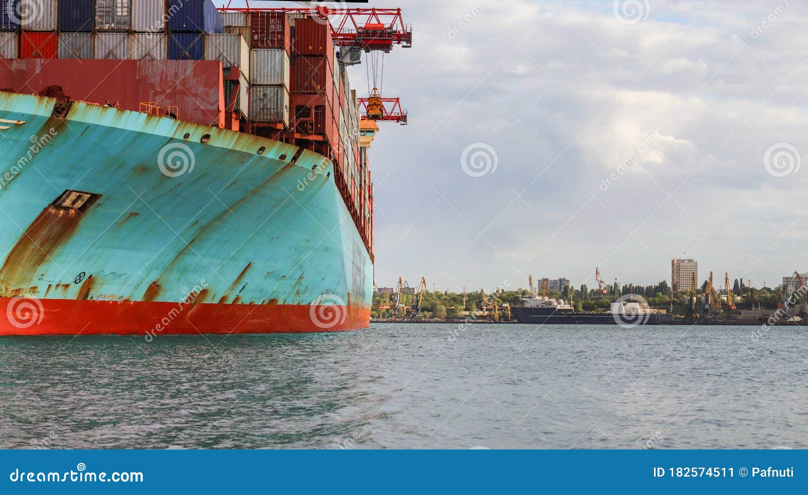 Container Cargo Ship Load in the Seaport. Logistics and Transportation ...