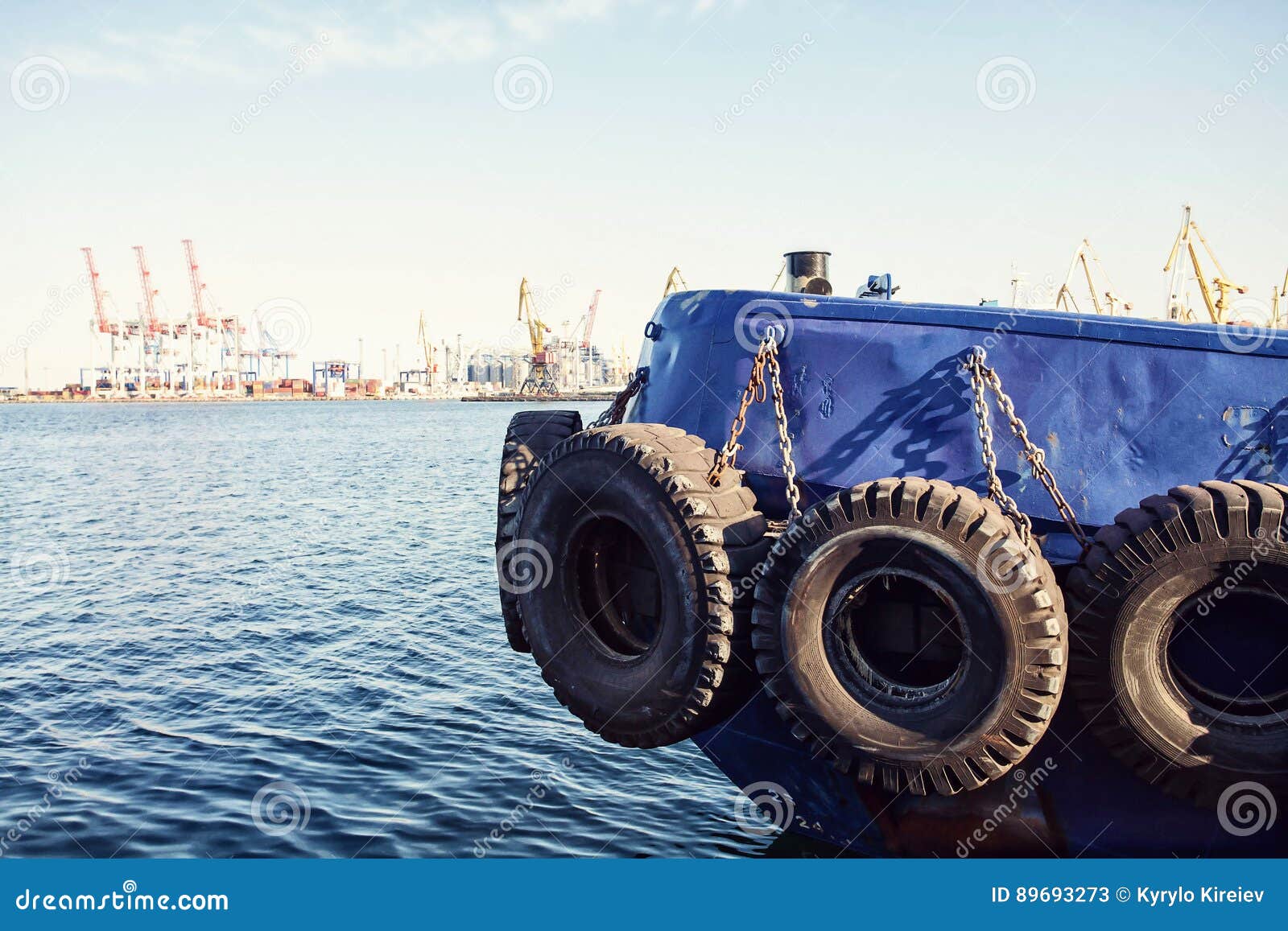 Container Cargo Ship with Working Crane Bridge in Shipyard Background ...