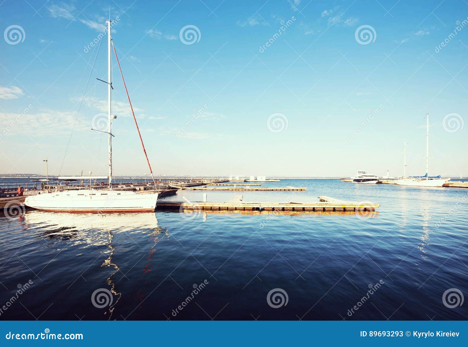 Container Cargo Ship with Working Crane Bridge in Shipyard Background ...