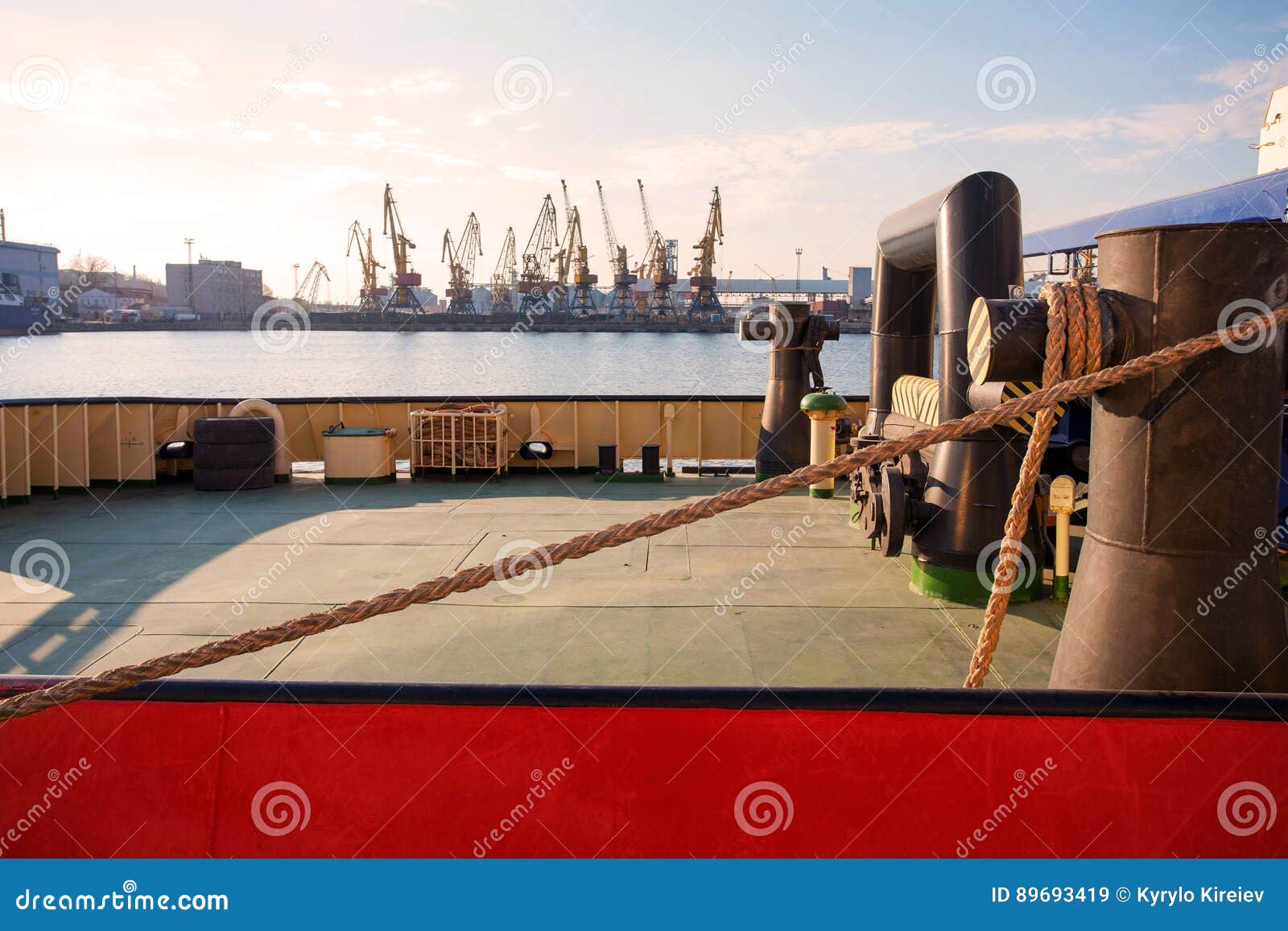 Container Cargo Ship with Working Crane Bridge in Shipyard Background ...